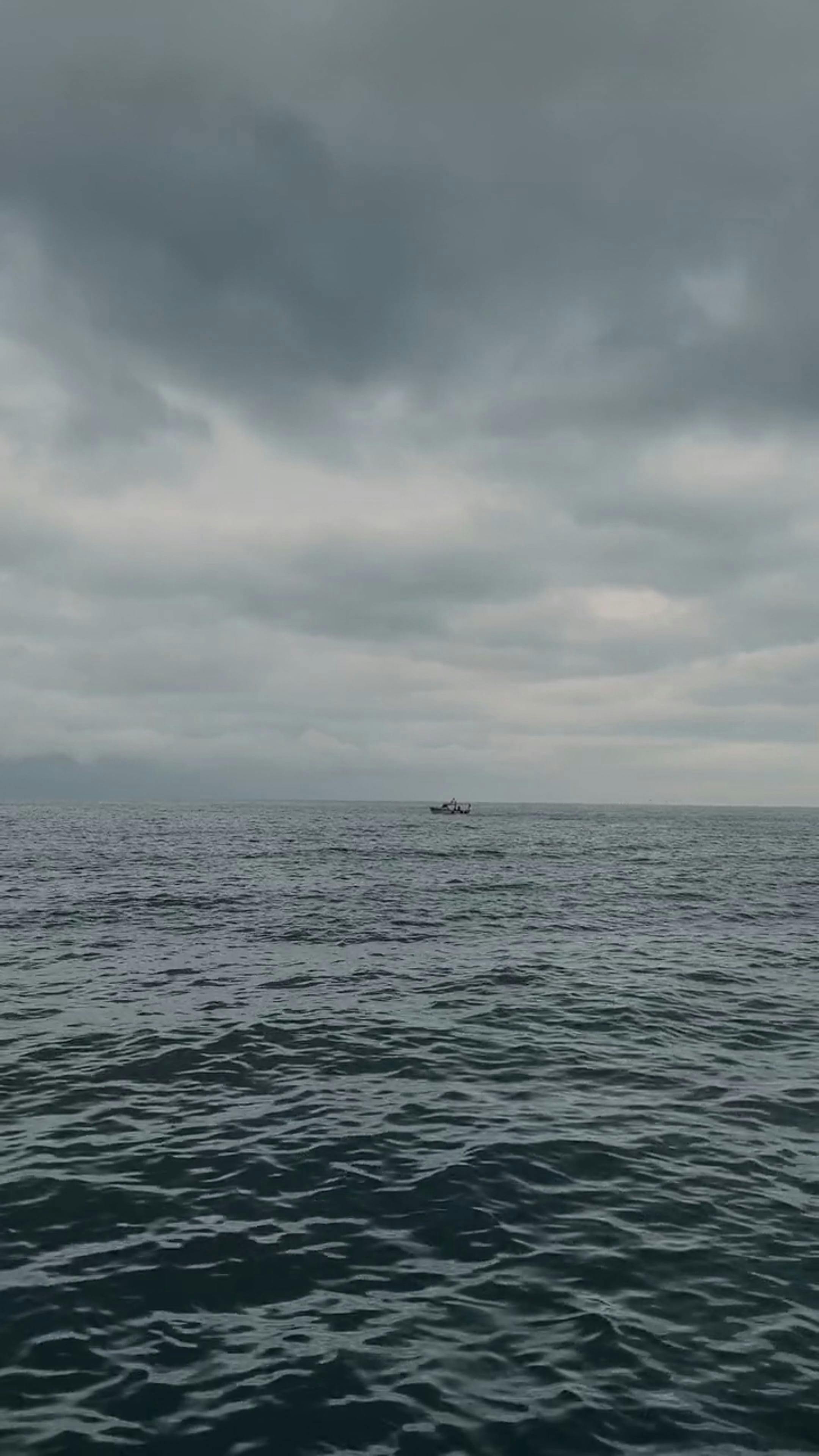 A Boat at Sea on a Cloudy Day Free Stock Video Footage, Royalty-Free 4K ...