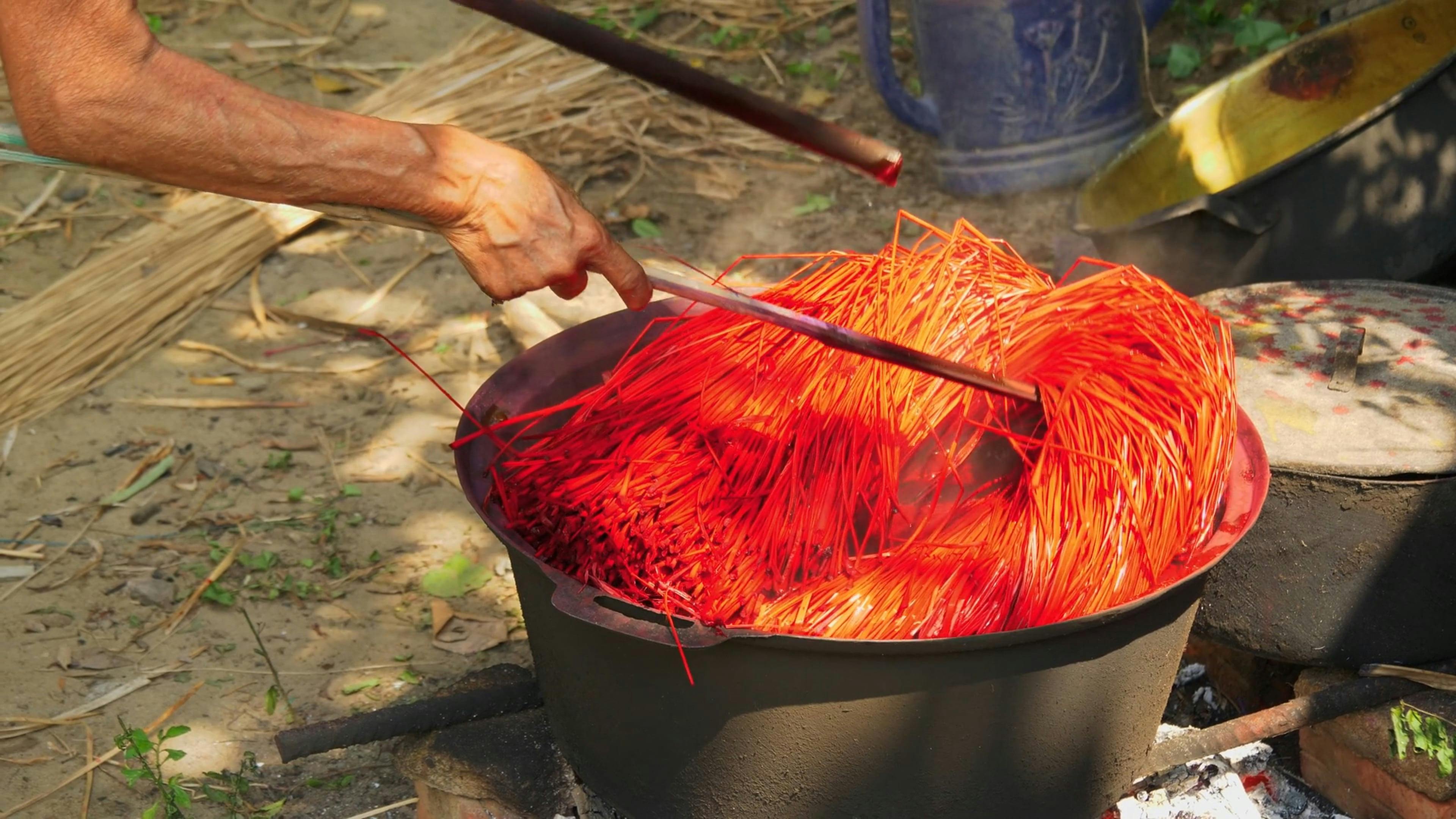 A pot of red dye being poured into a pot Free Stock Video Footage ...