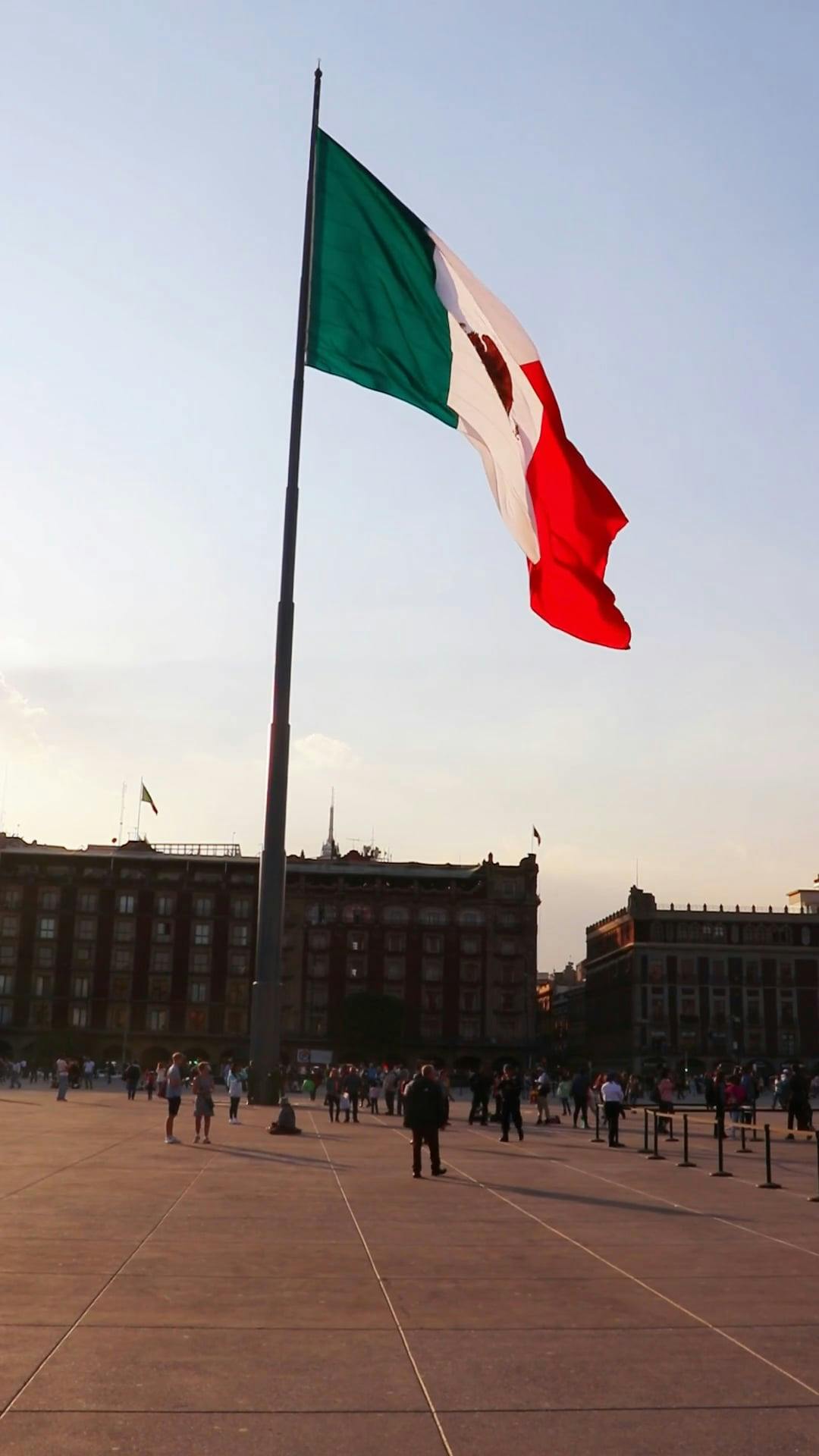 A mexican flag flying over a city Free Stock Video Footage, Royalty ...