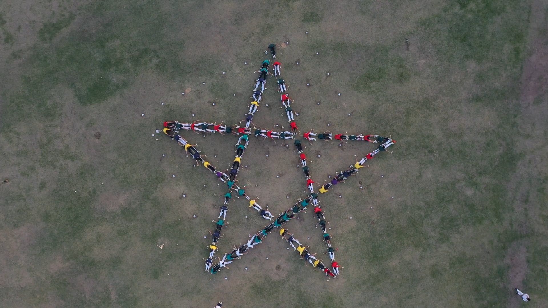 A Group of People Forming a Star on the Ground Free Stock Video Footage ...