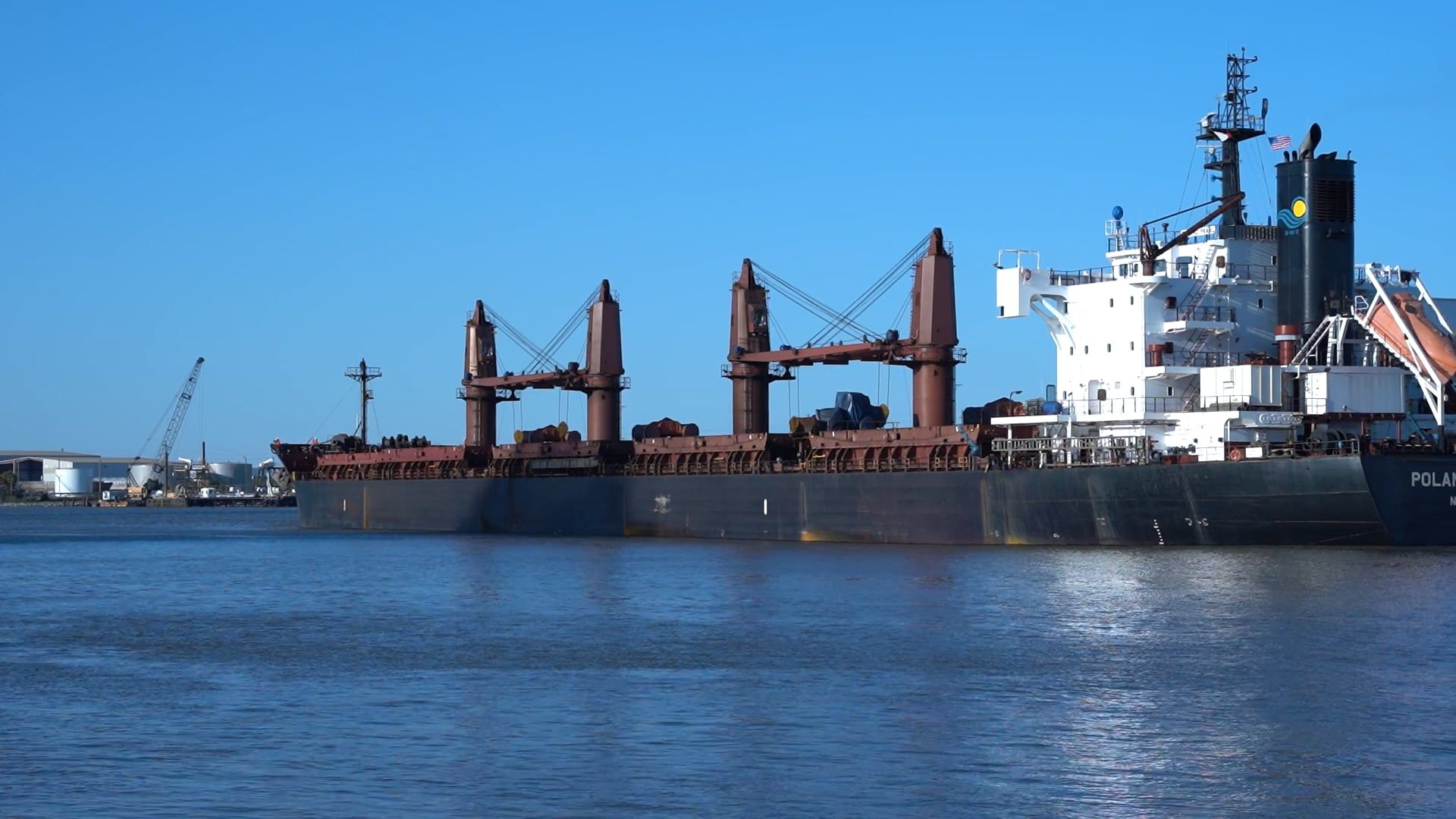 A large cargo ship is docked in the water Free Stock Video Footage ...