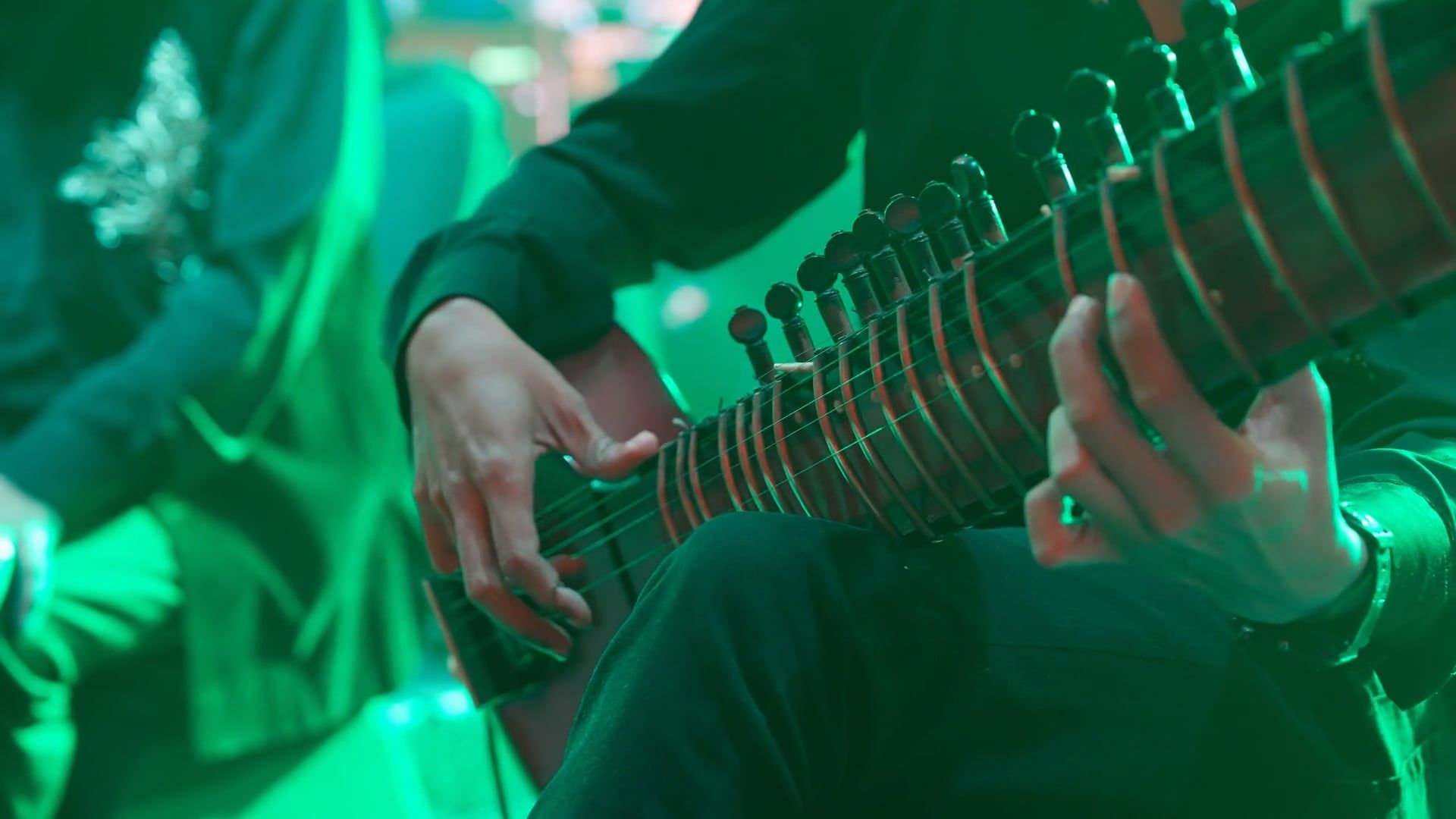 A man playing an indian instrument on stage Free Stock Video Footage ...