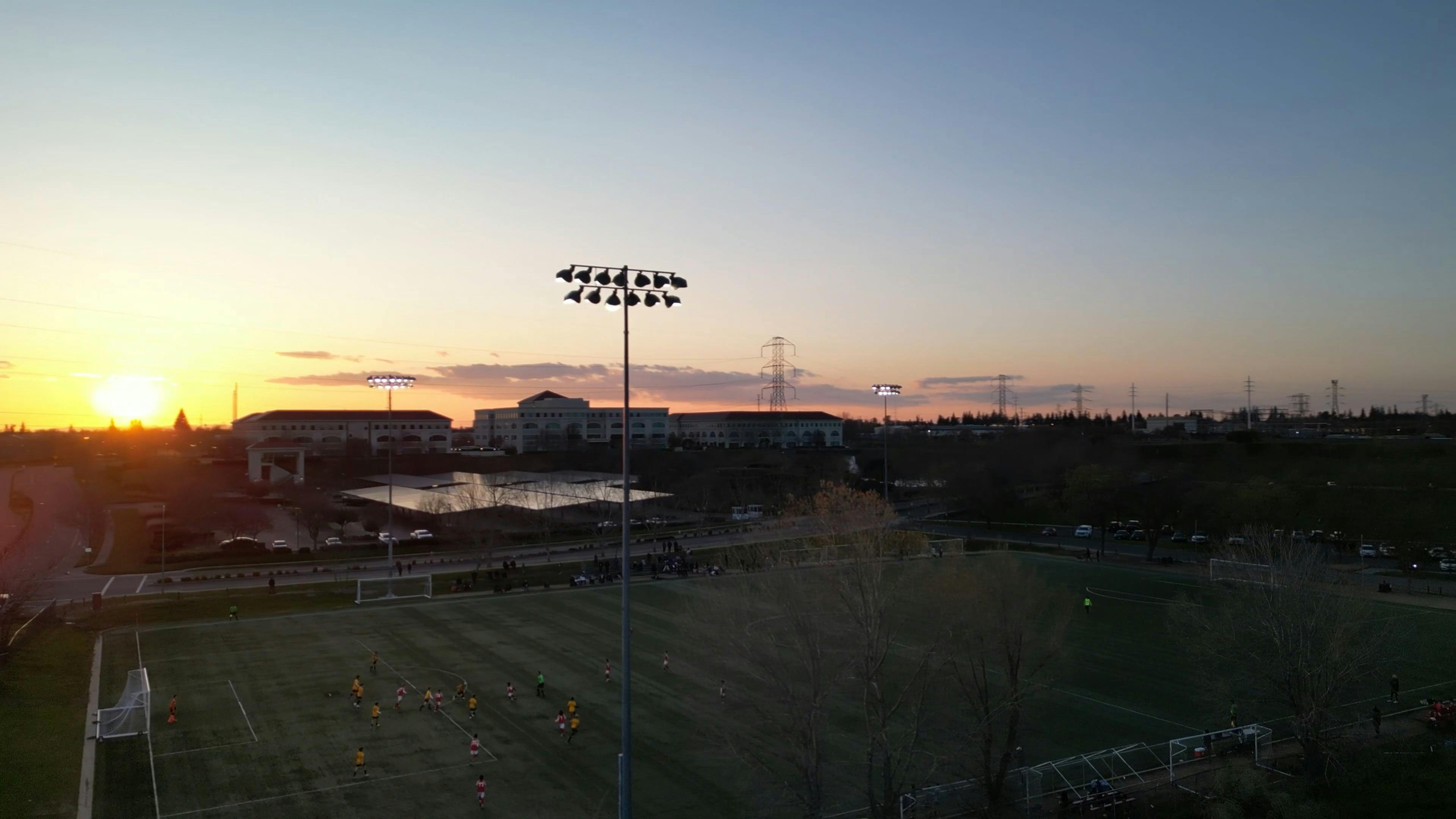 Drone Footage of a Football Field at Sunset Free Stock Video Footage ...