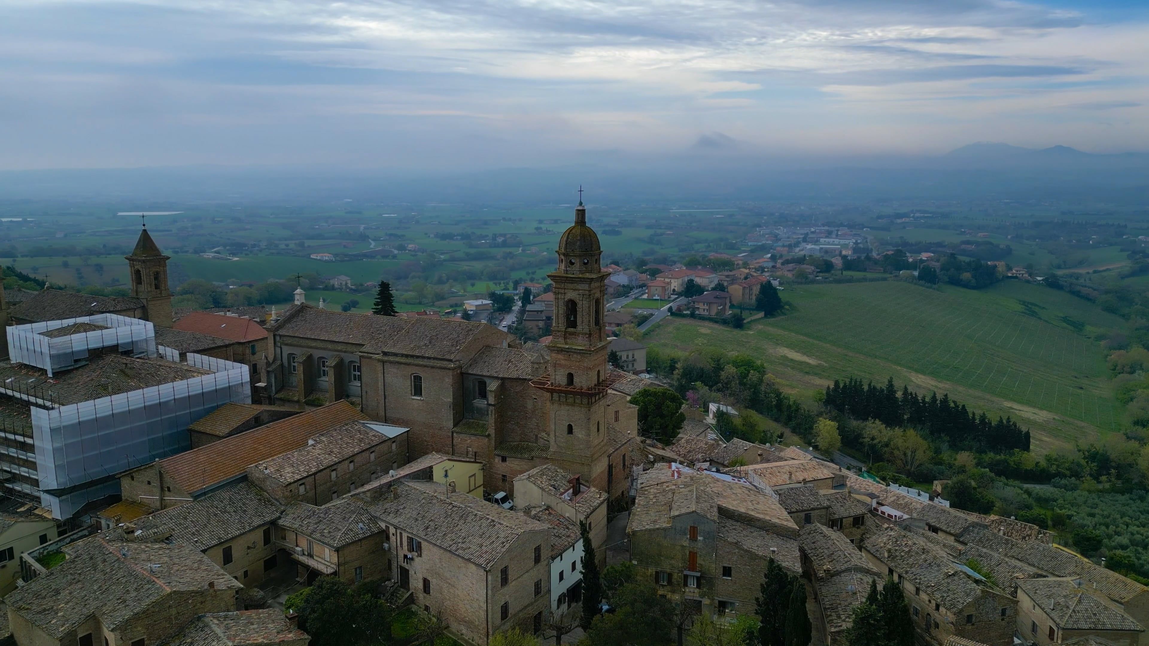 The view from the top of a hill overlooking a town Free Stock Video ...