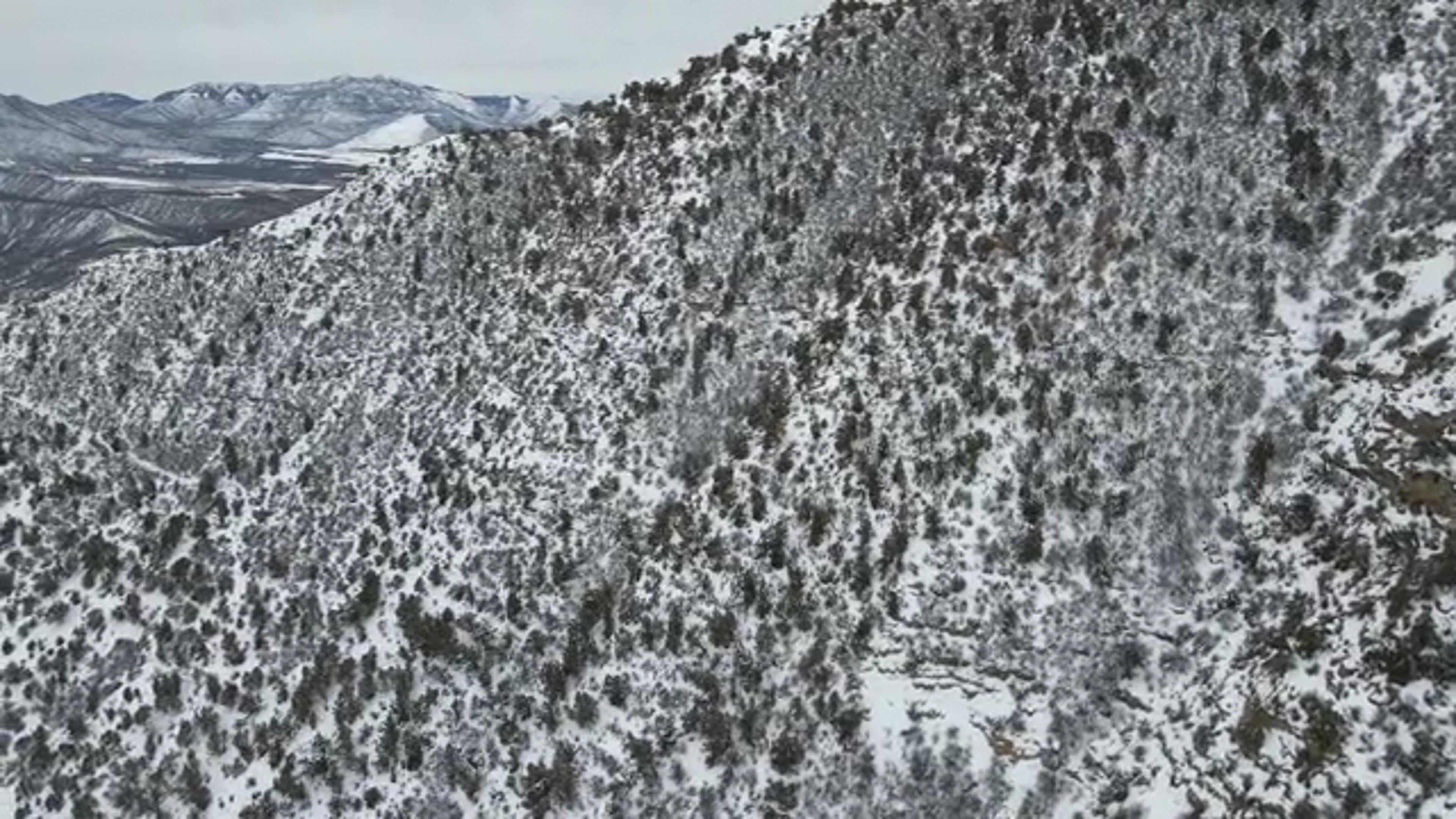 Breathtaking snow covered mountain filmed in 4k by a drone Free Stock ...
