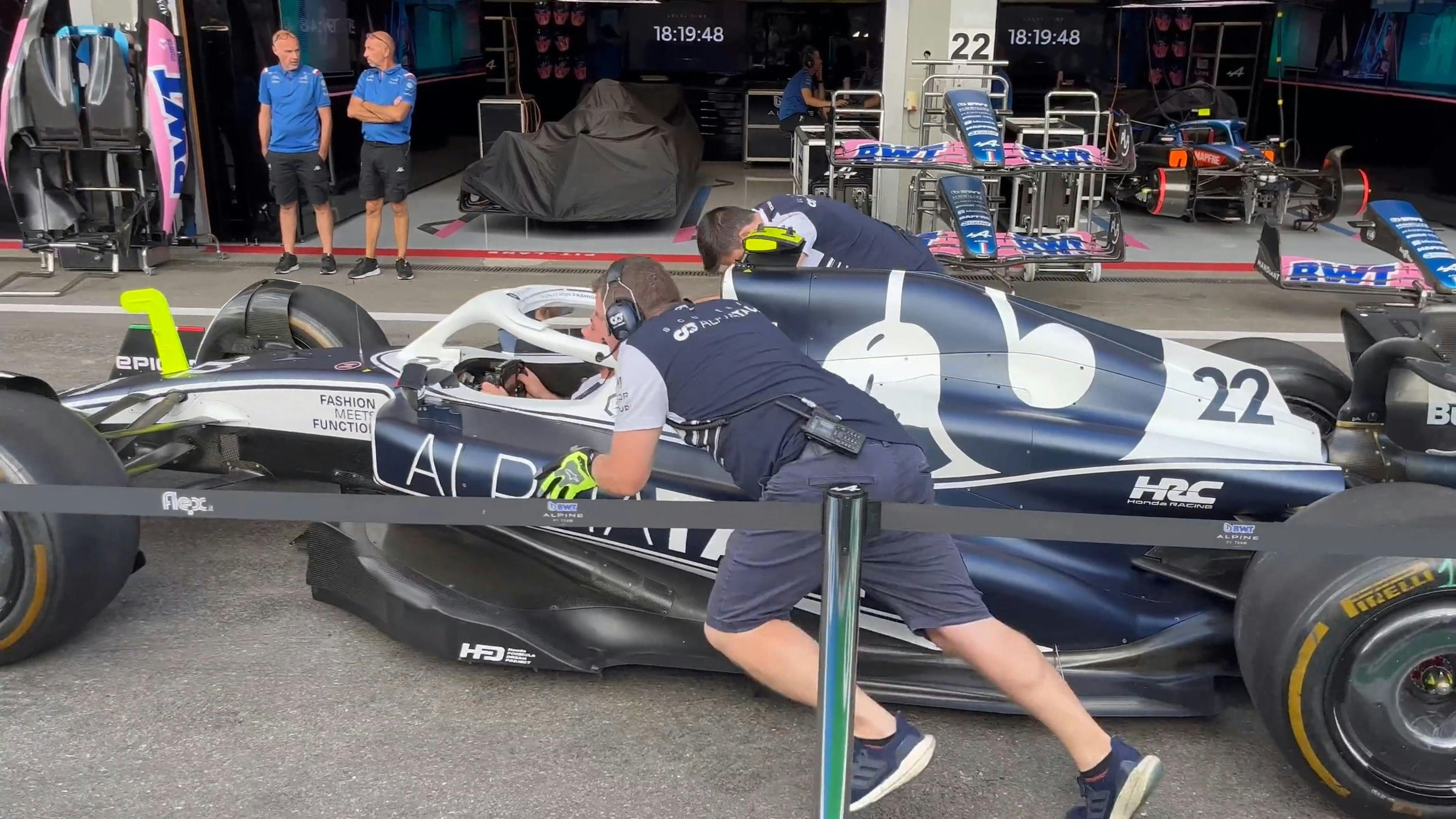 Pit Crew Members Pushing a F1 Car Free Stock Video Footage, Royalty ...