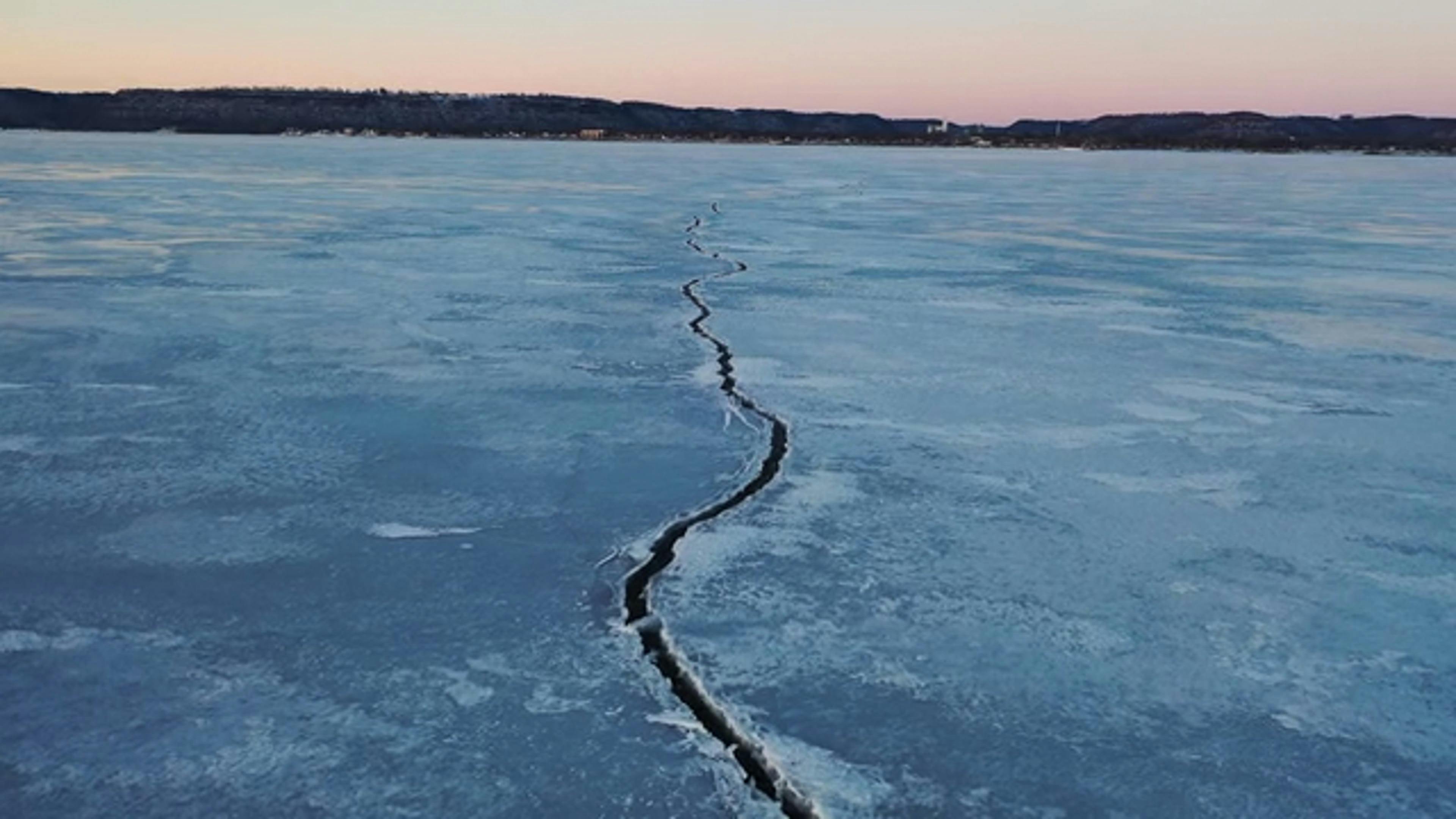 A crack in the ice on a frozen lake Free Stock Video Footage, Royalty ...