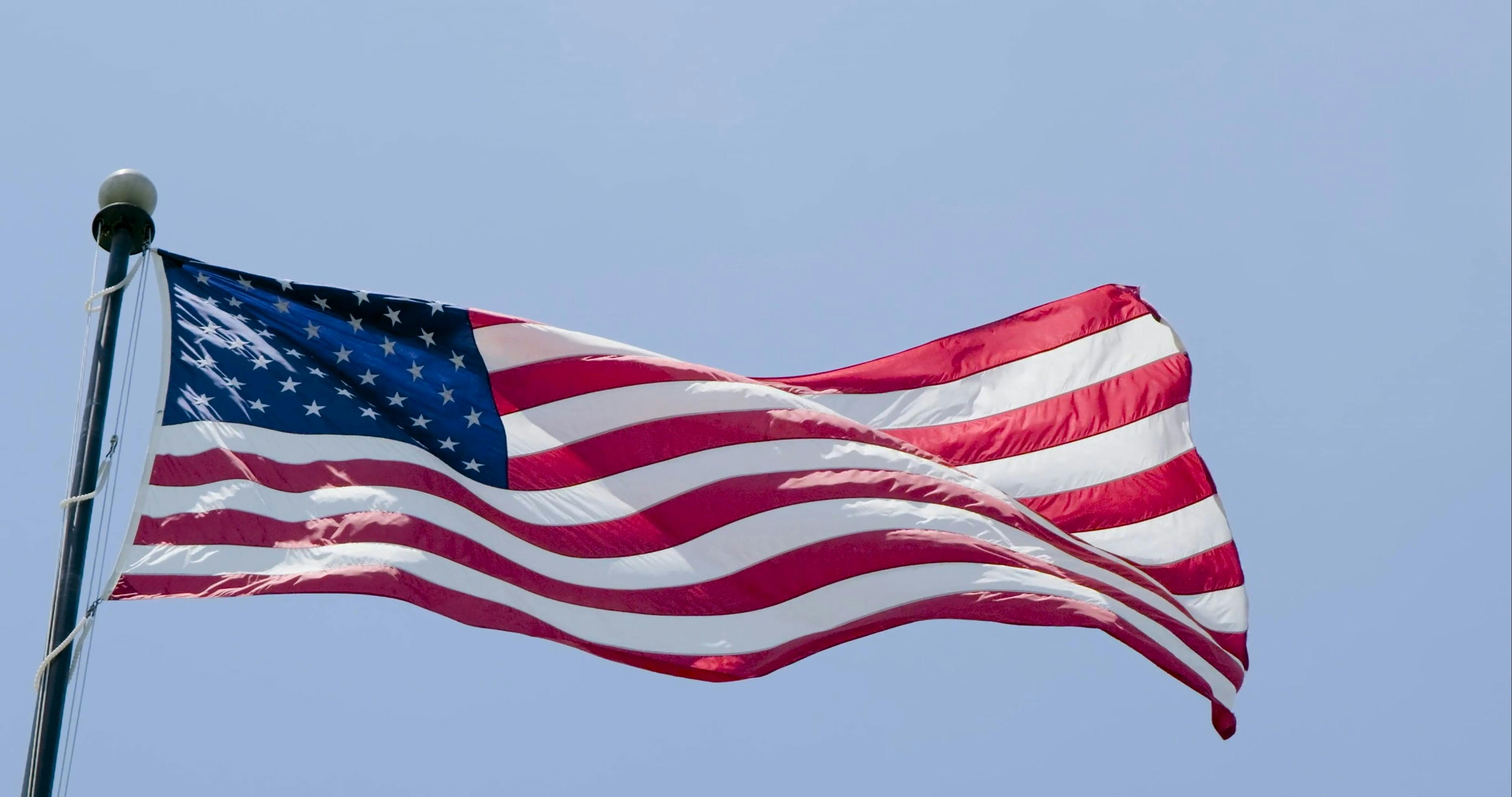 The American Flag Raised High In A Flag Pole Free Stock Video Footage ...