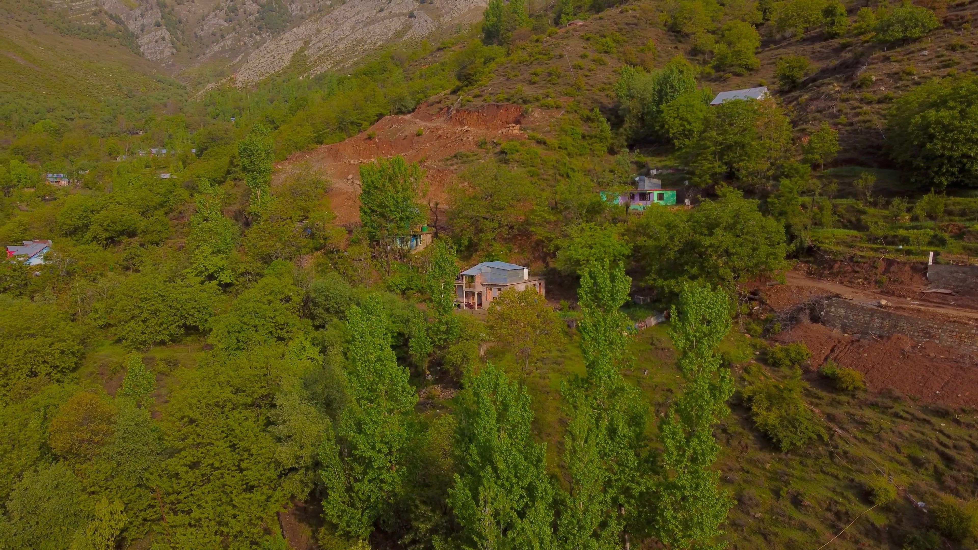 An aerial view of a house on a hillside Free Stock Video Footage ...