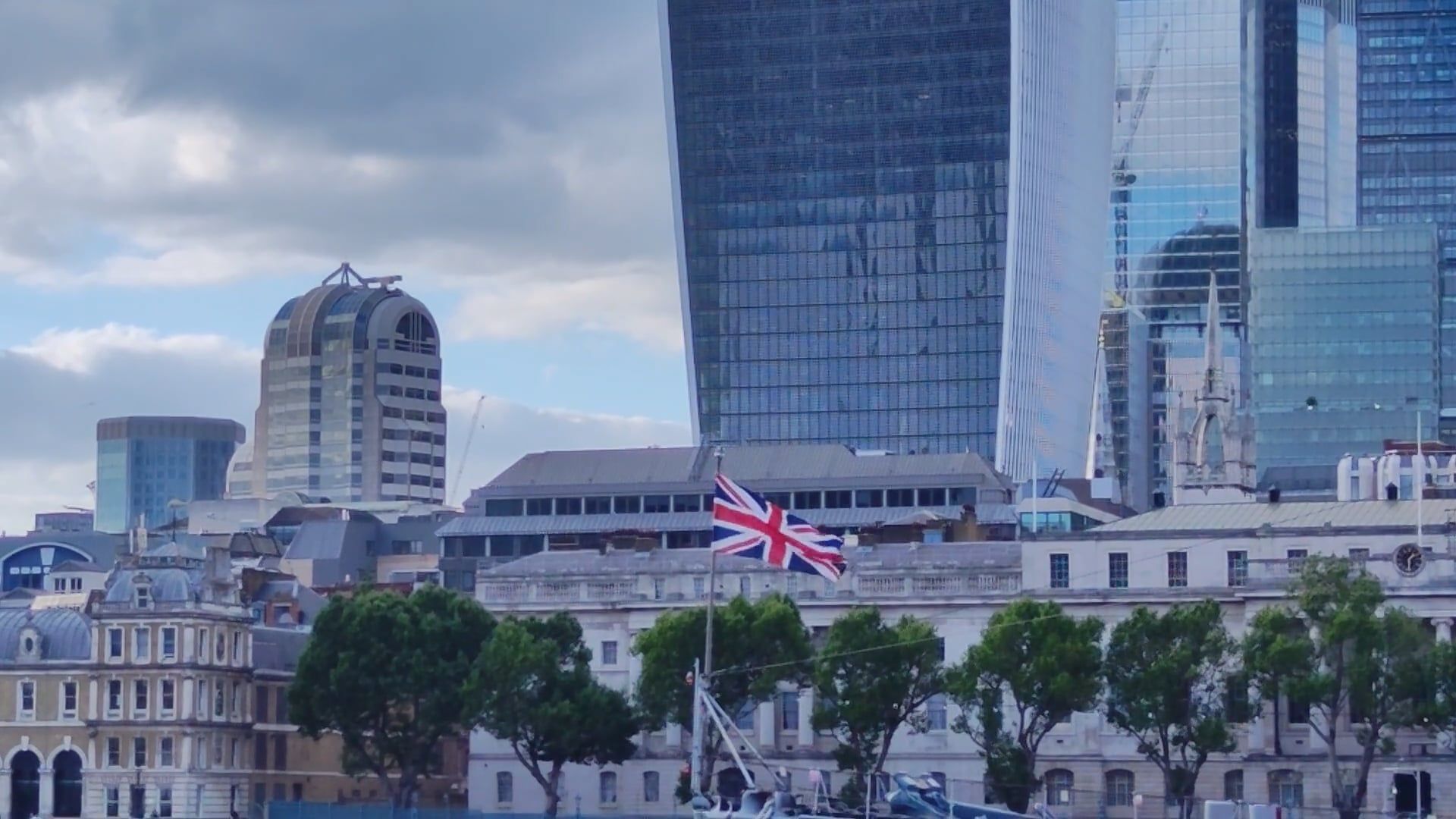 The Flag of the United Kingdom Waving on a Pole in London City Centre ...