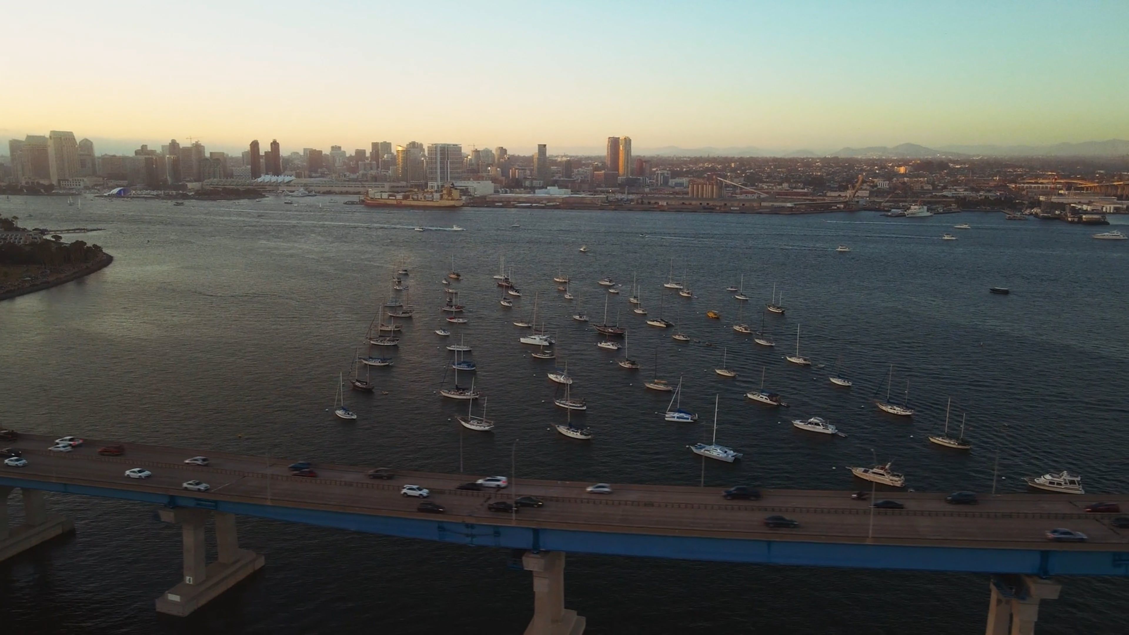Boats in Bay Between Bridge and City Skyline Free Stock Video Footage ...