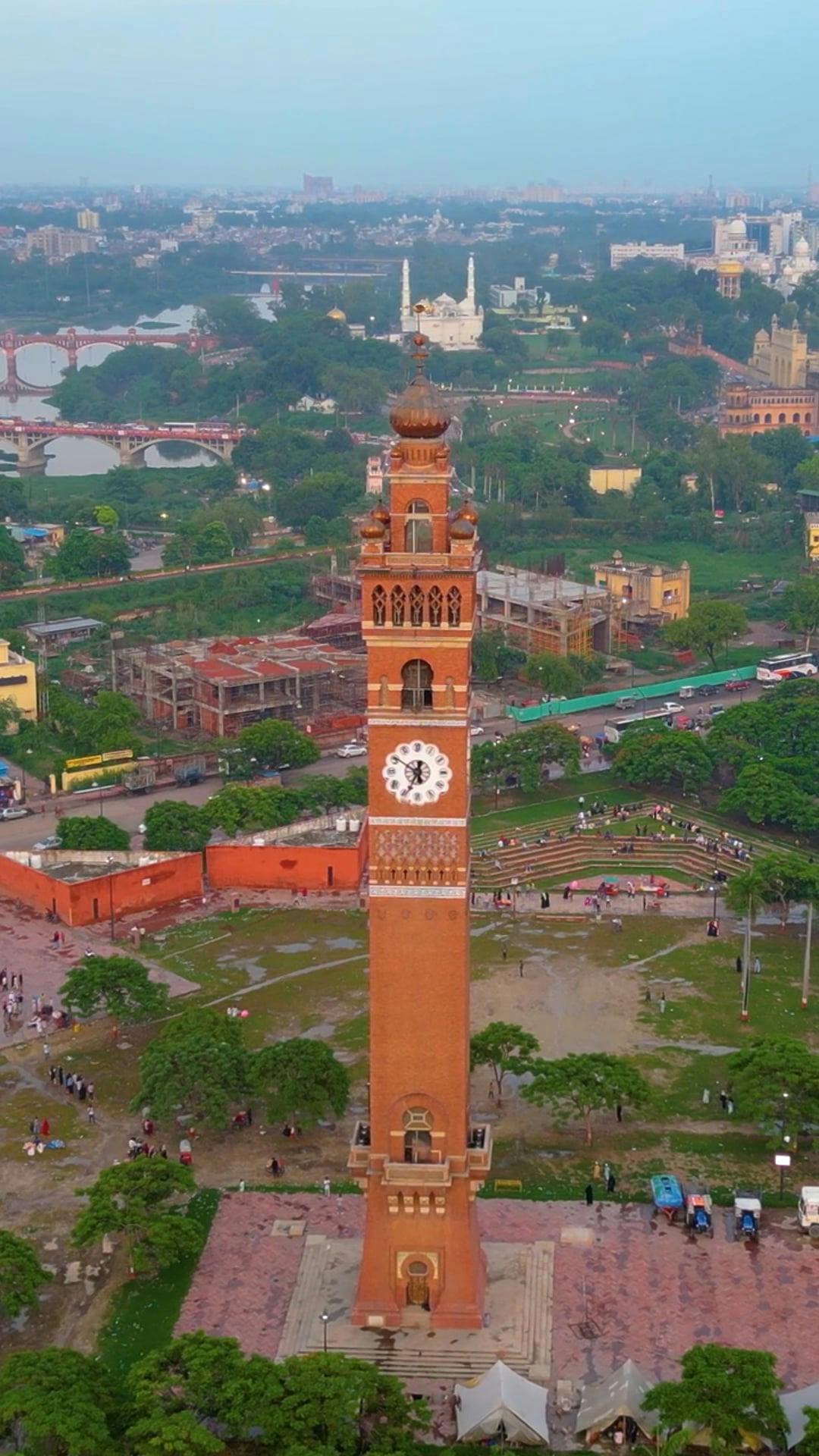 An aerial view of a clock tower in a city Free Stock Video Footage ...