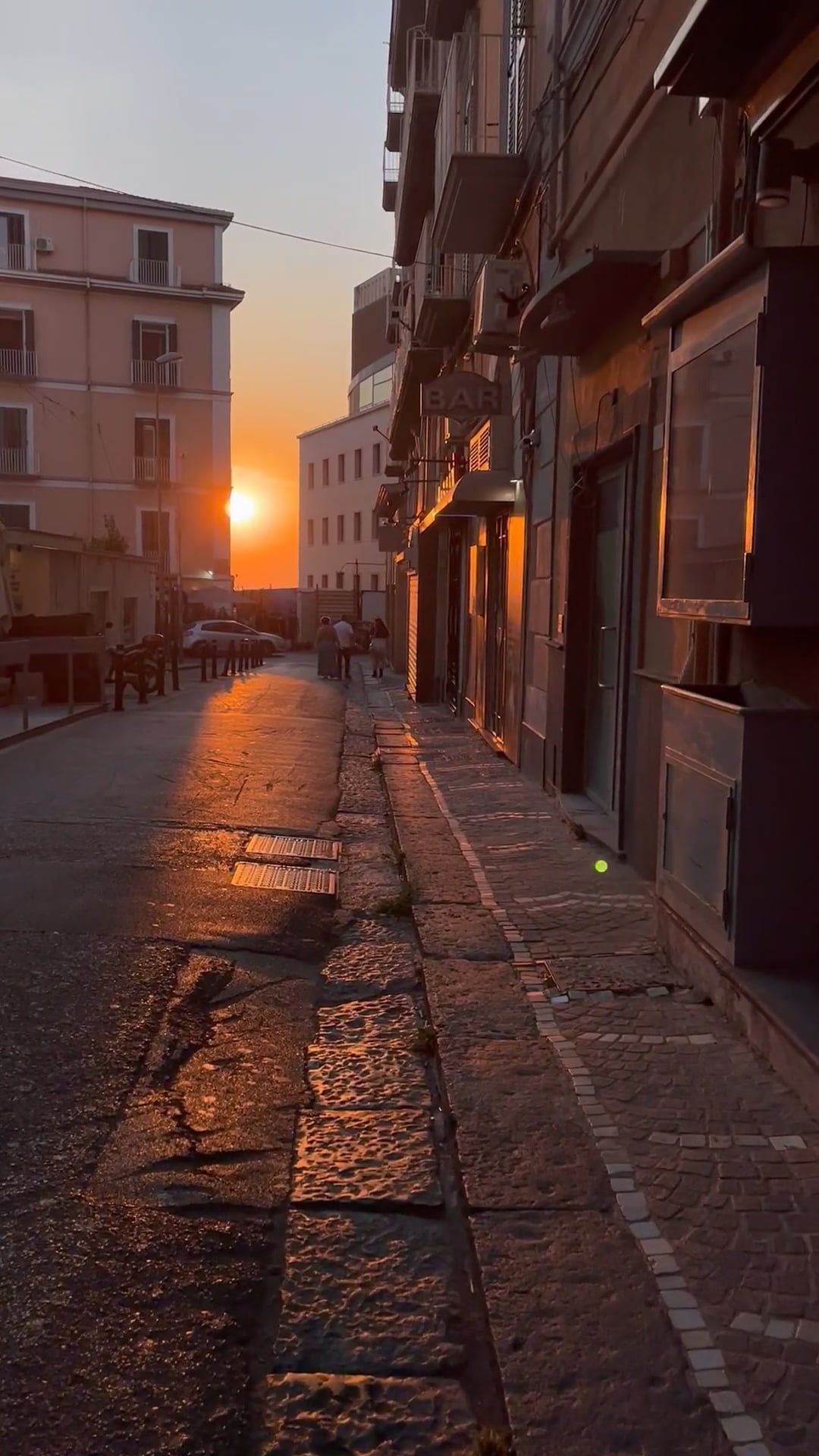 The sun is setting over a street in an old city Free Stock Video ...
