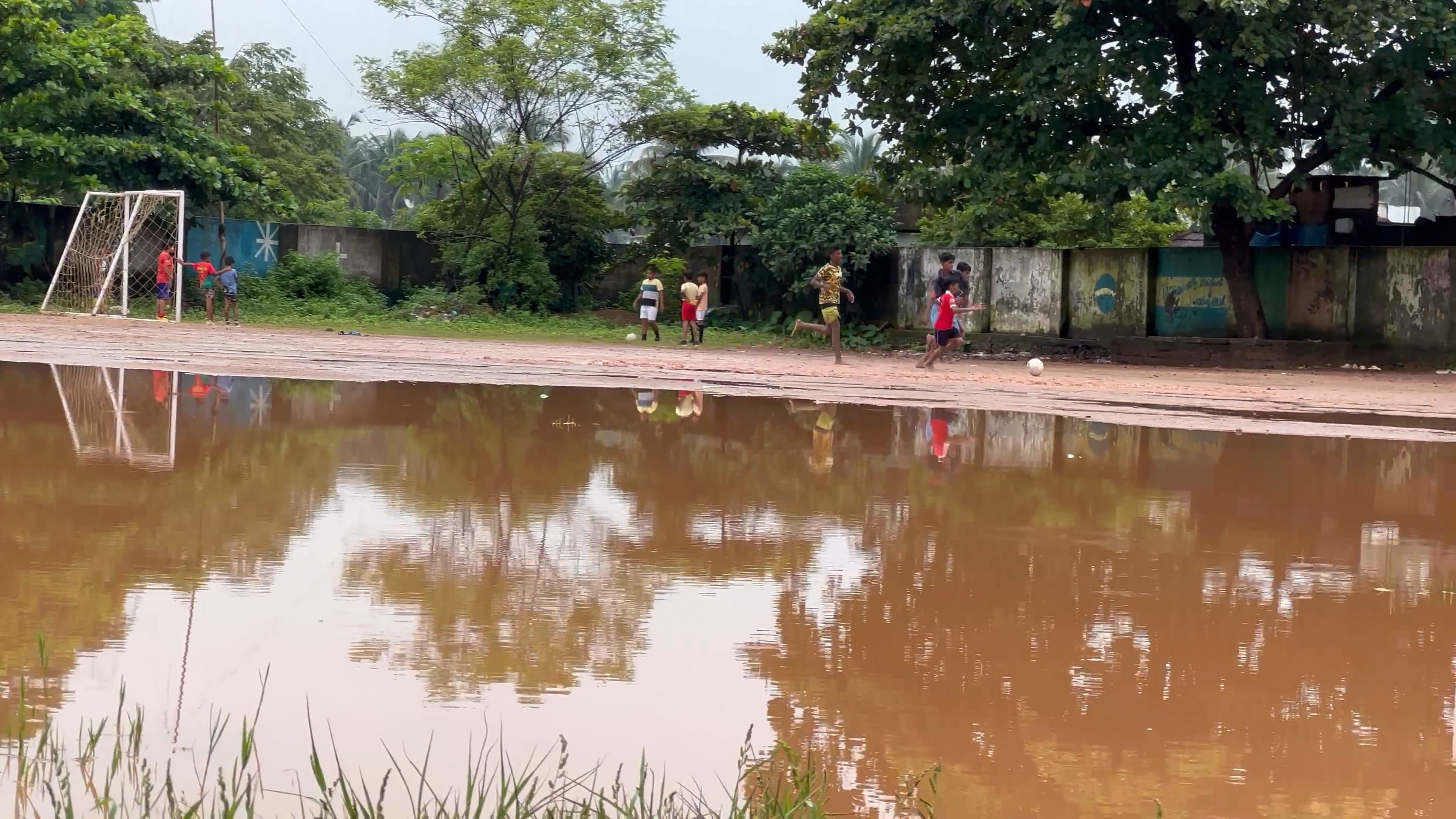 A soccer field with a puddle of water Free Stock Video Footage, Royalty ...