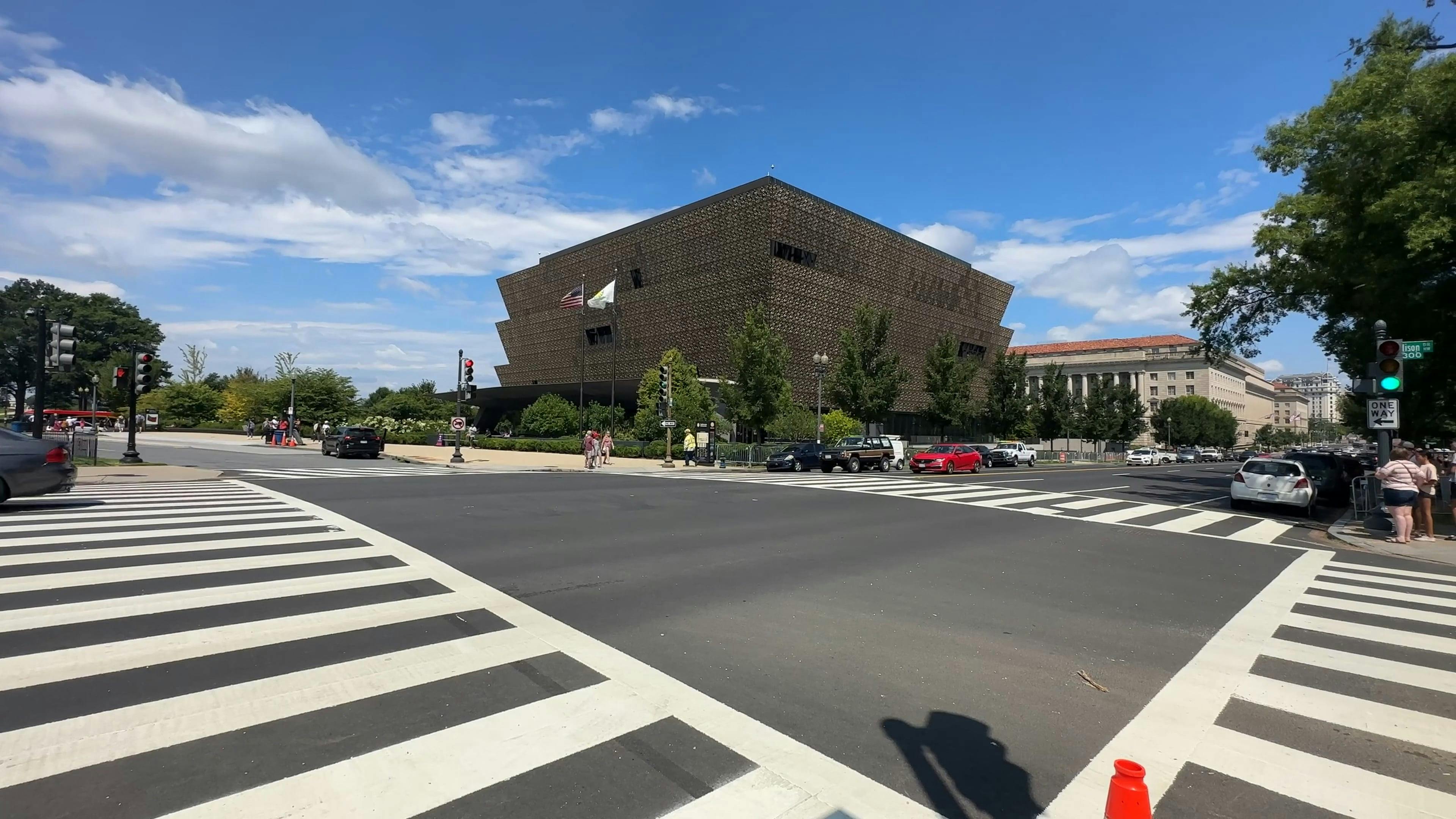 A street view of a building with a crosswalk Free Stock Video Footage ...