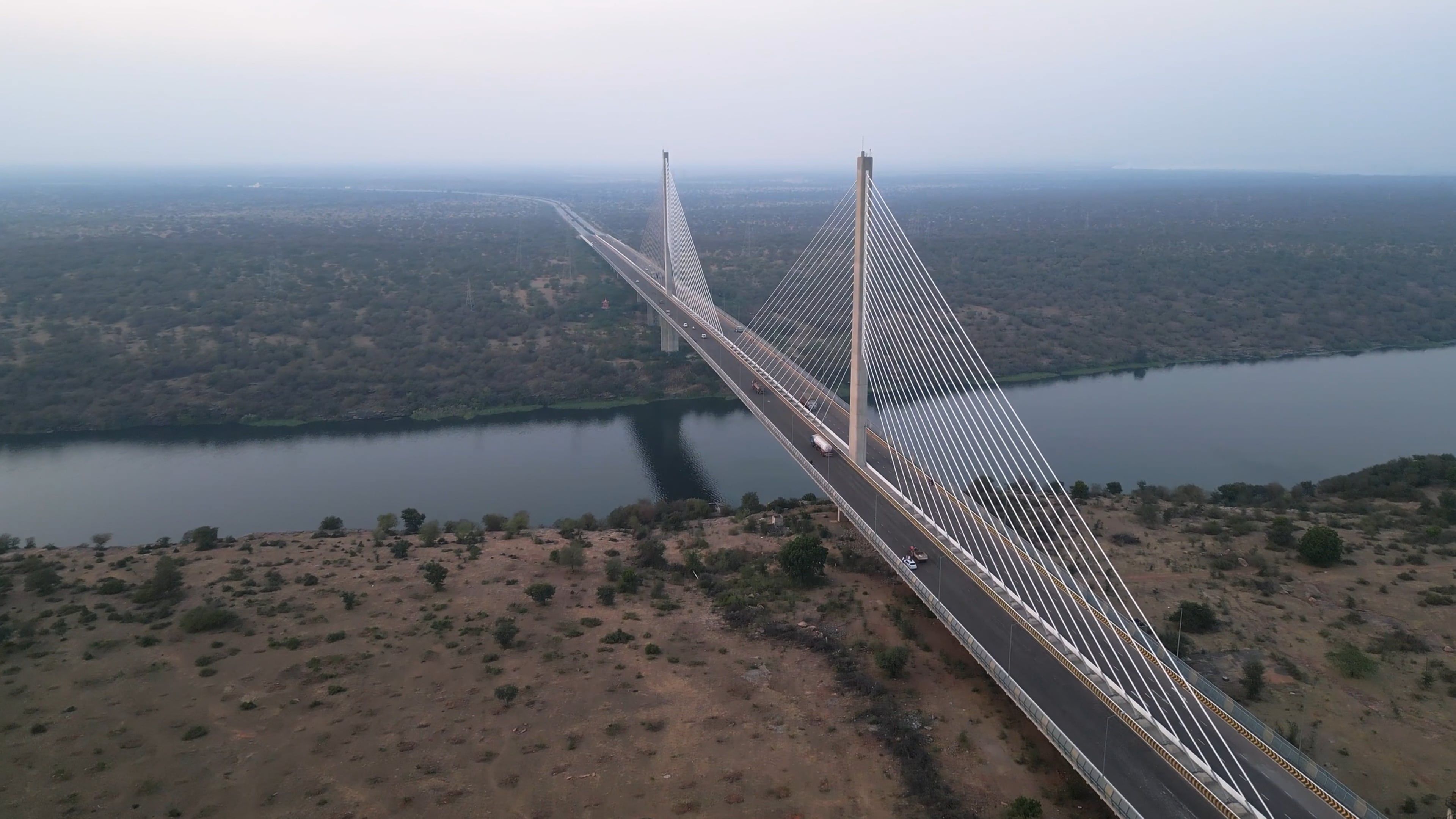 A long bridge over a river with a large body of water Free Stock Video ...