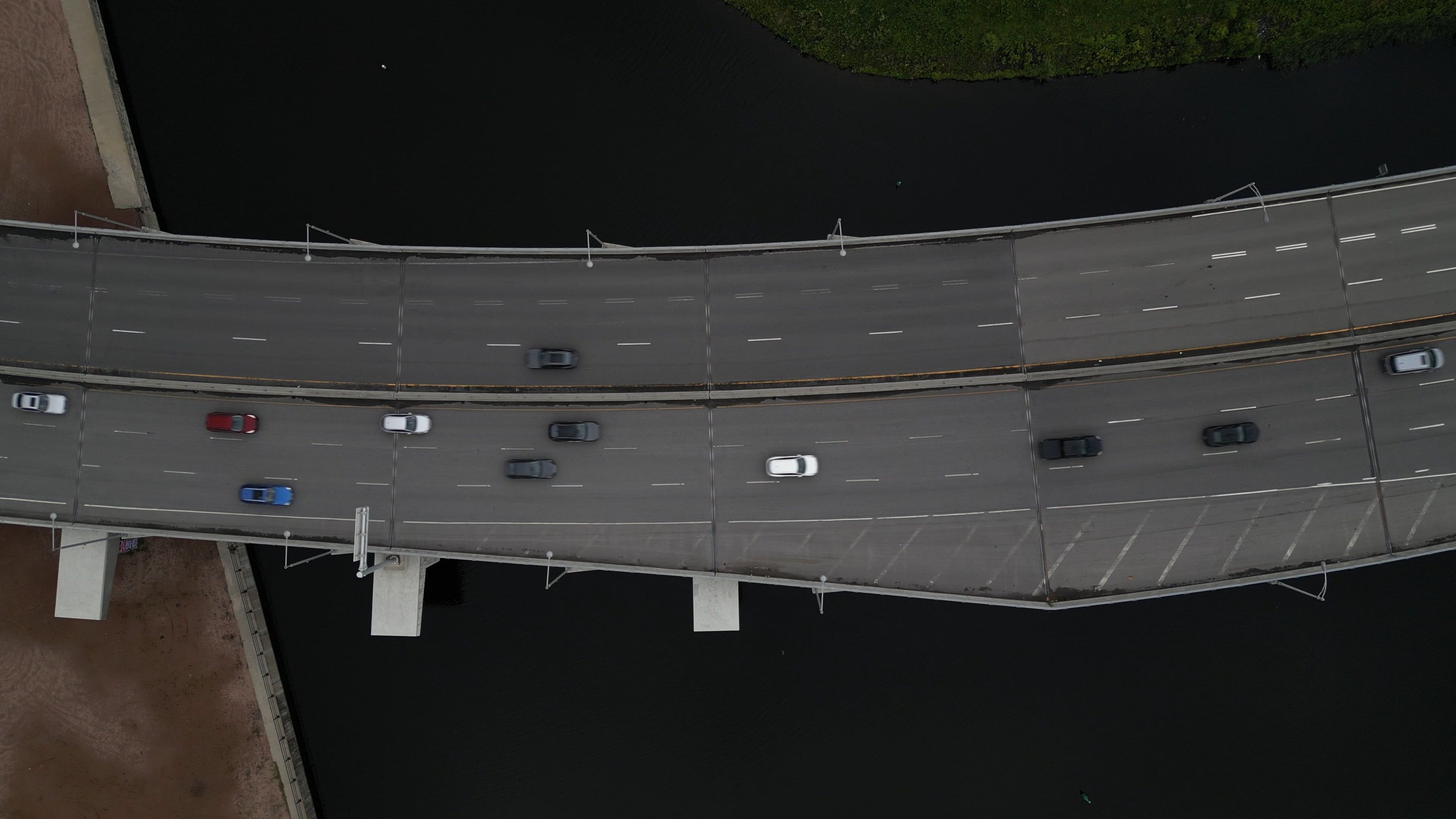 An aerial view of cars driving on a bridge Free Stock Video Footage ...