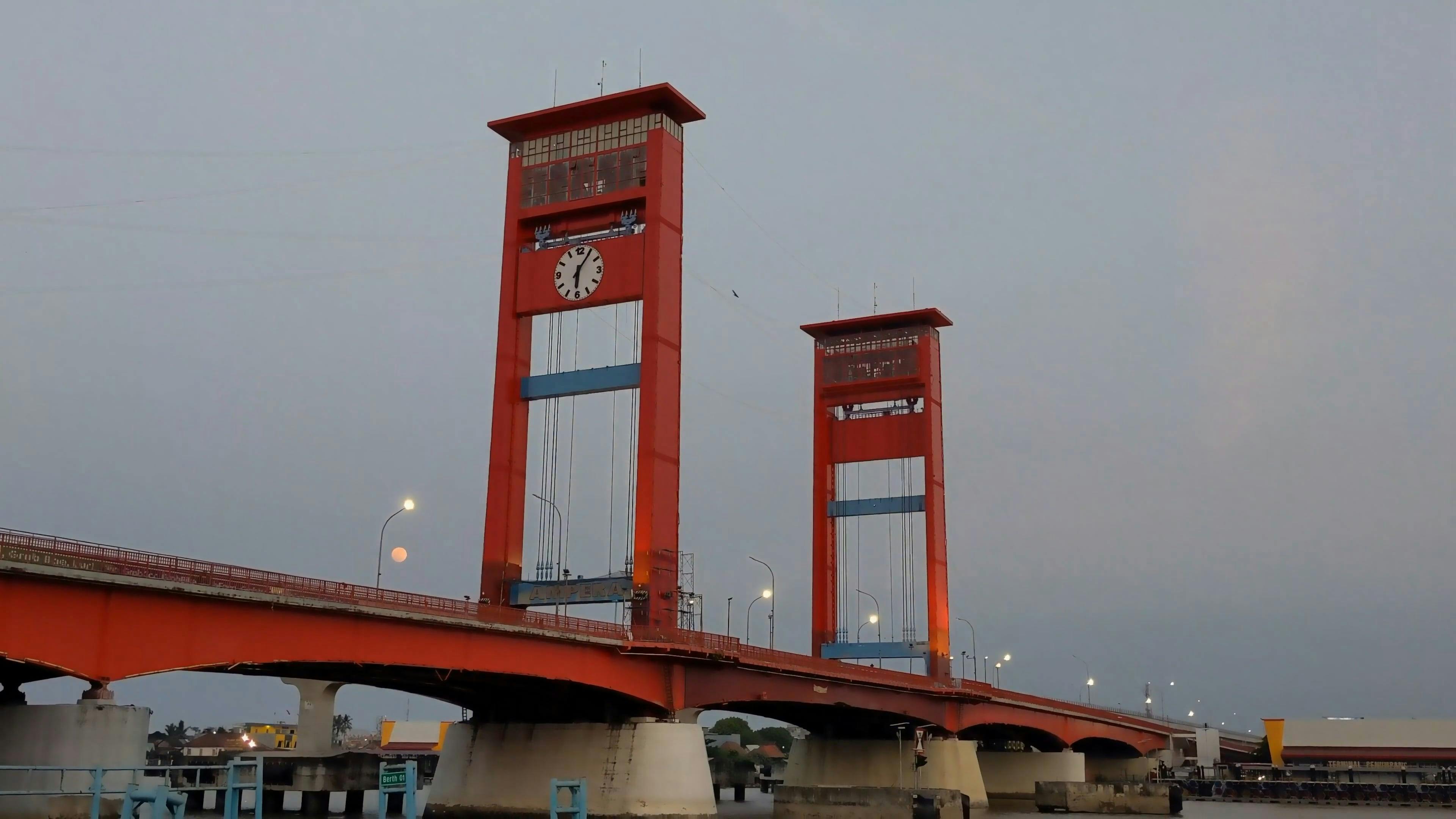 Lovely Ampera Bridge time lapse footage while sunset with illuminated ...