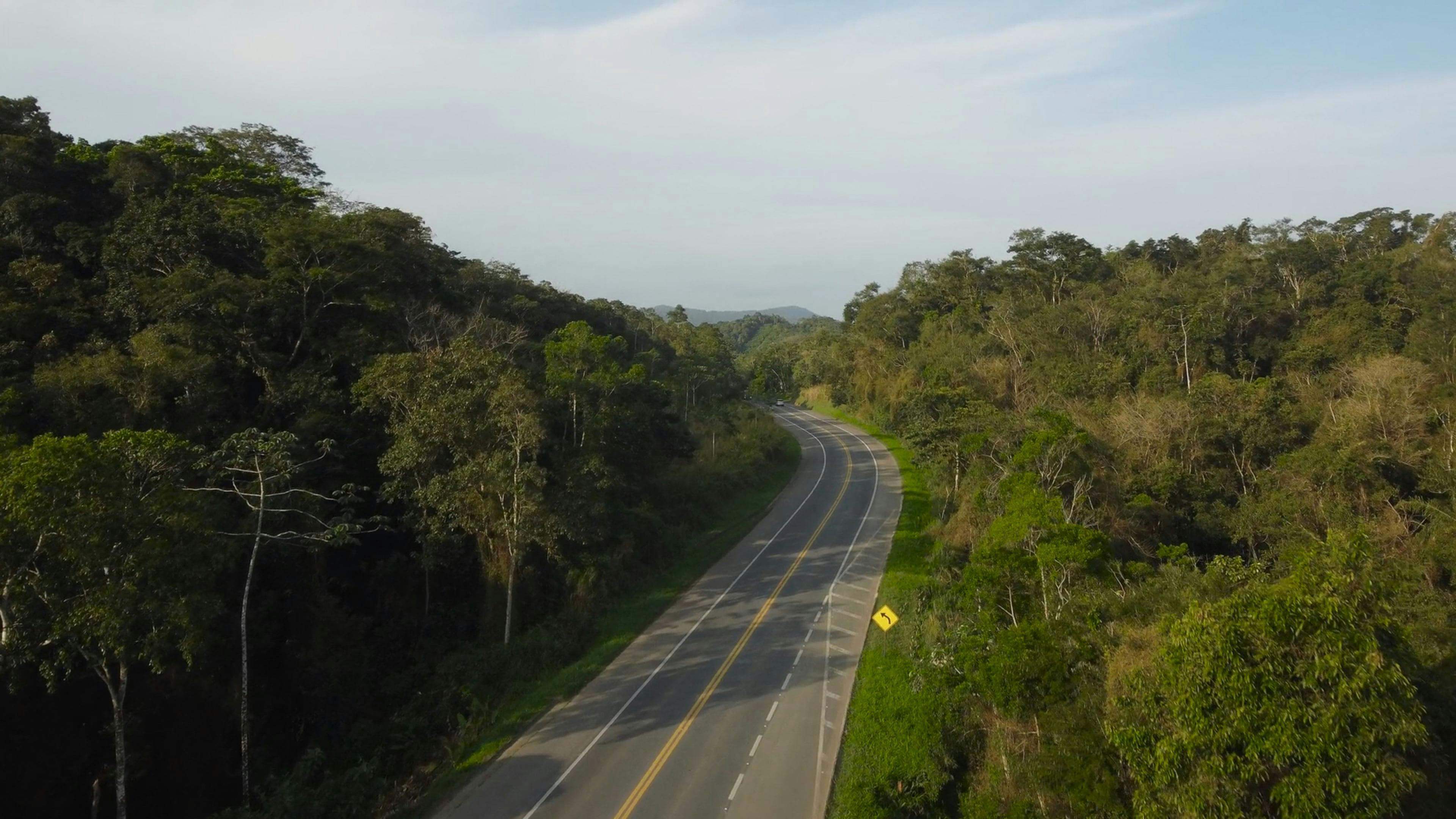 Drone footage of a highway surrounded by beautiful nature Free Stock ...