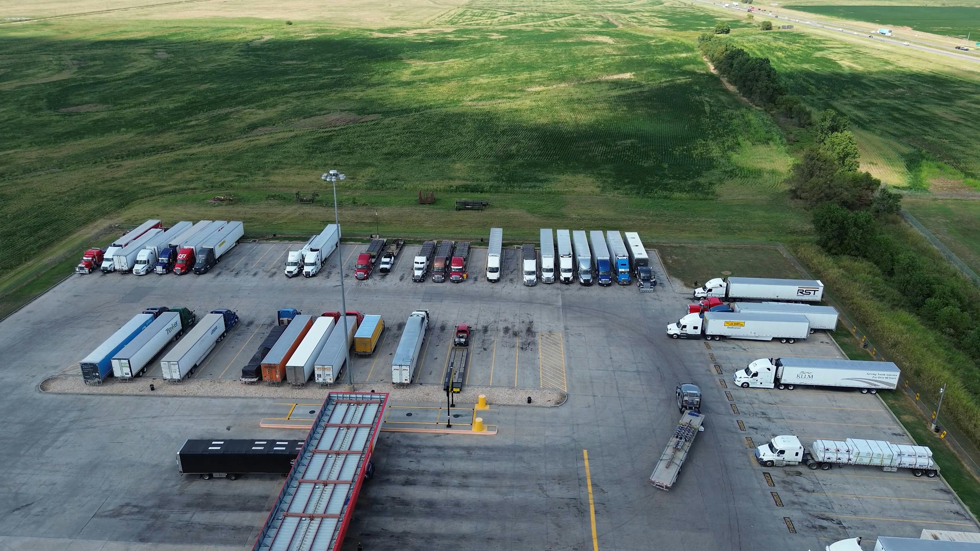 Drone Video of Transport Trucks at Logistic Yard Free Stock Video ...