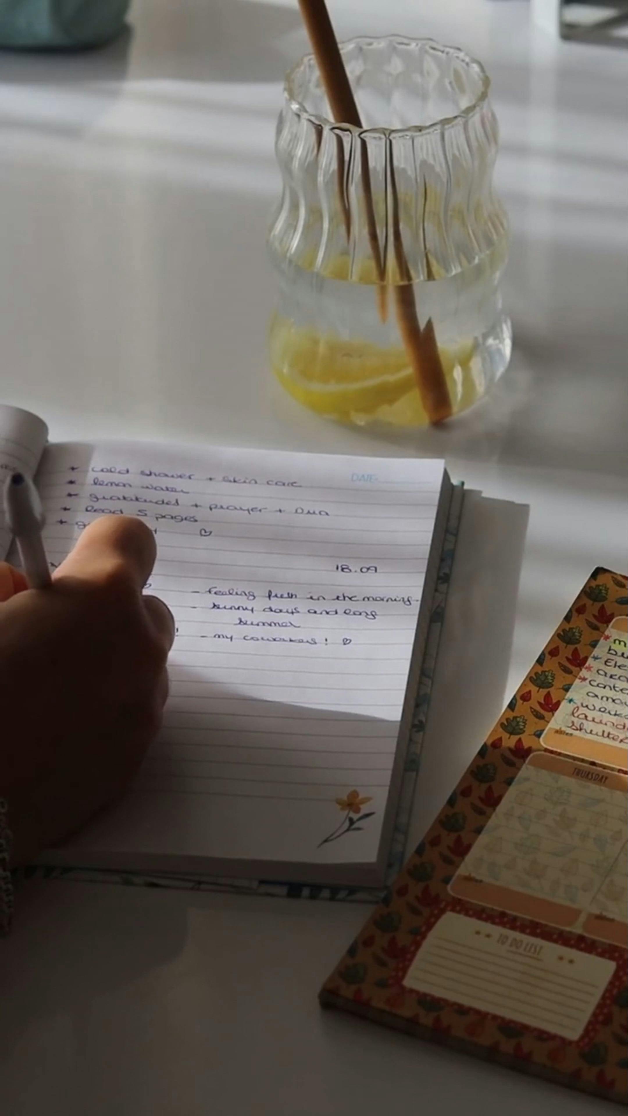 journaling with lemon water white background Free Stock Video Footage ...