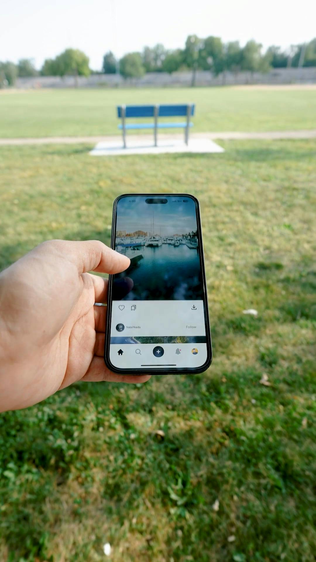A person holding up a cell phone in a field Free Stock Video Footage ...