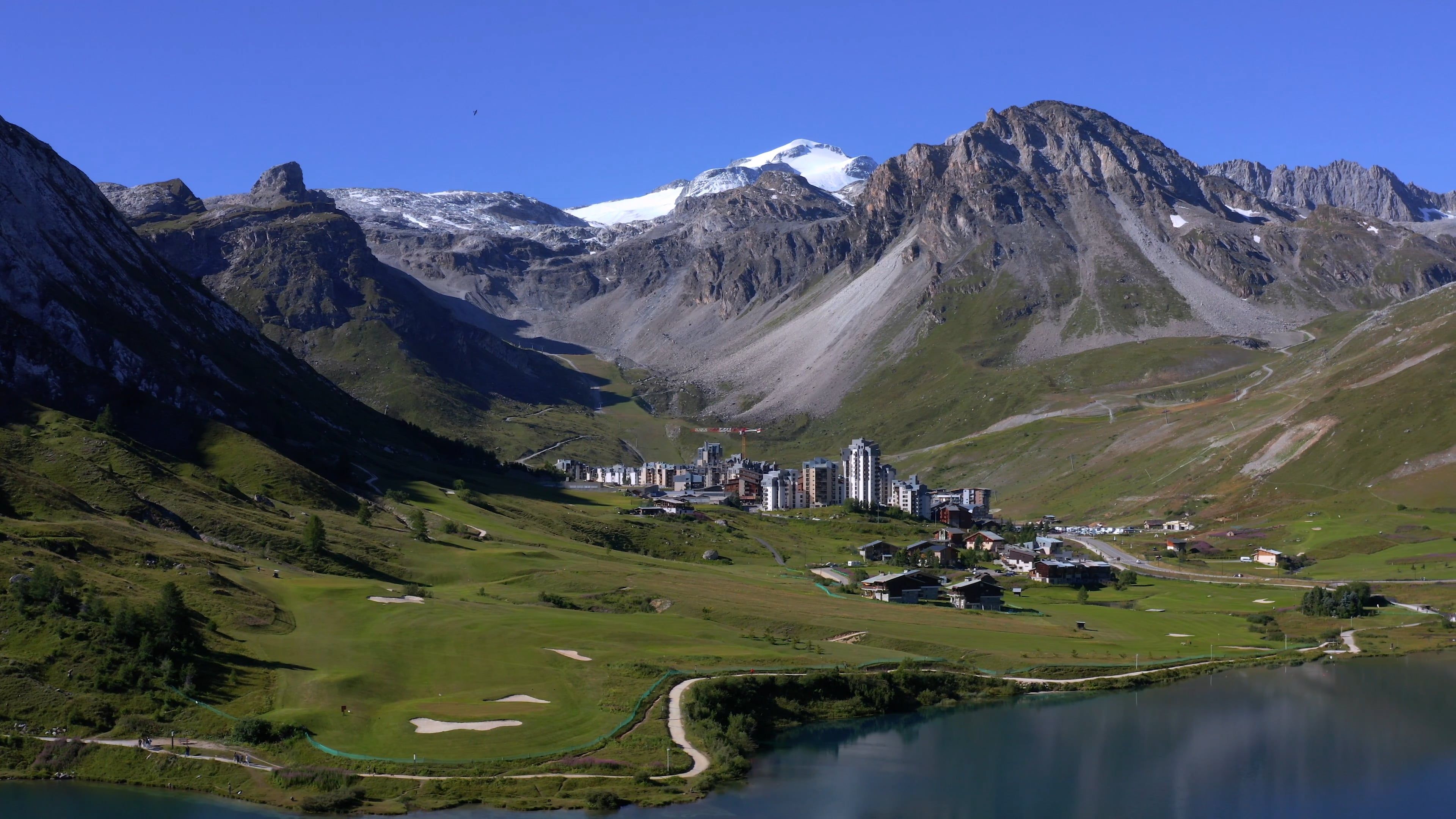 Tignes - Flying with a drone above the lake of Tignes and discovering a ...