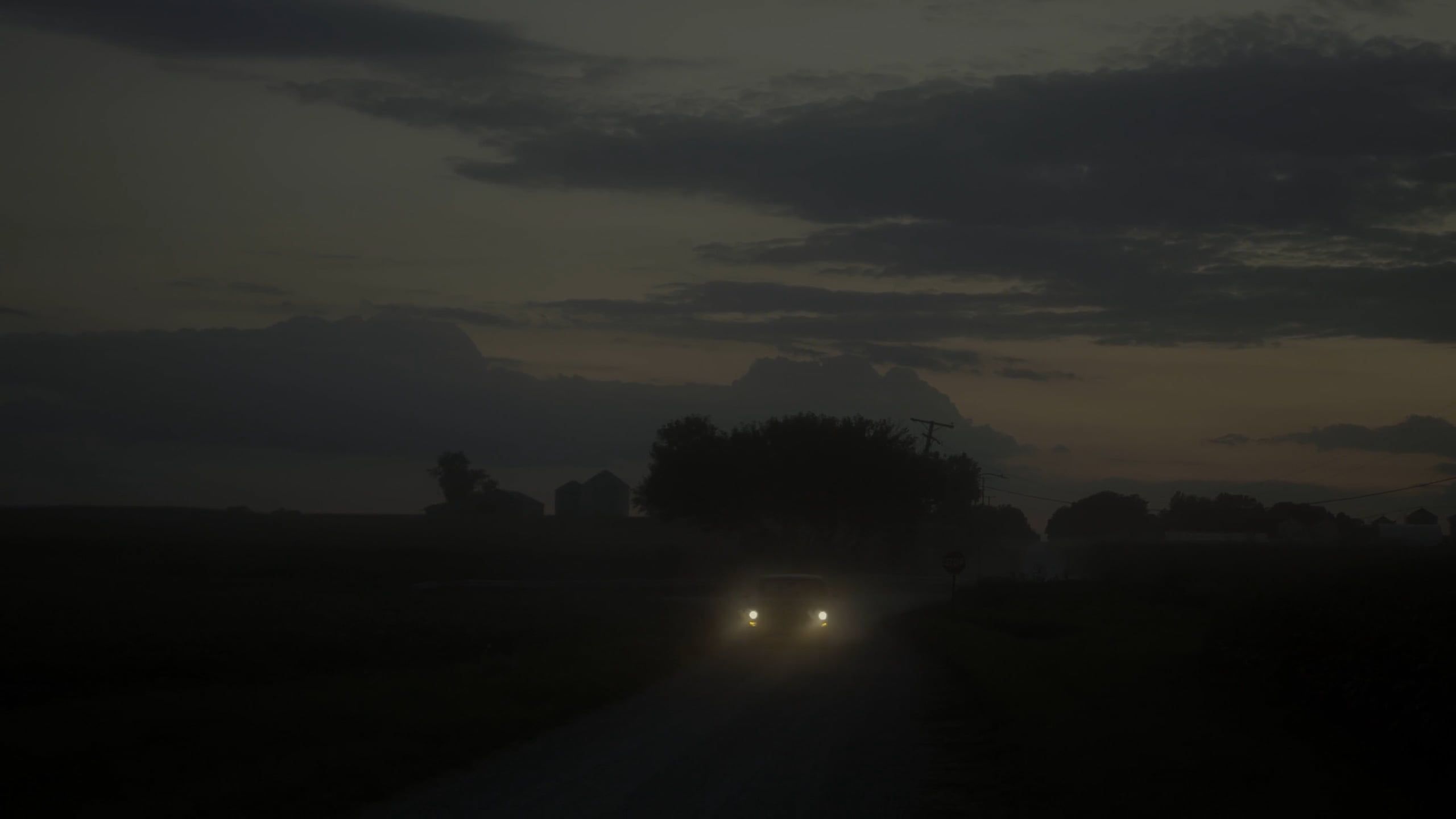 A car is driving down a country road at night Free Stock Video Footage ...