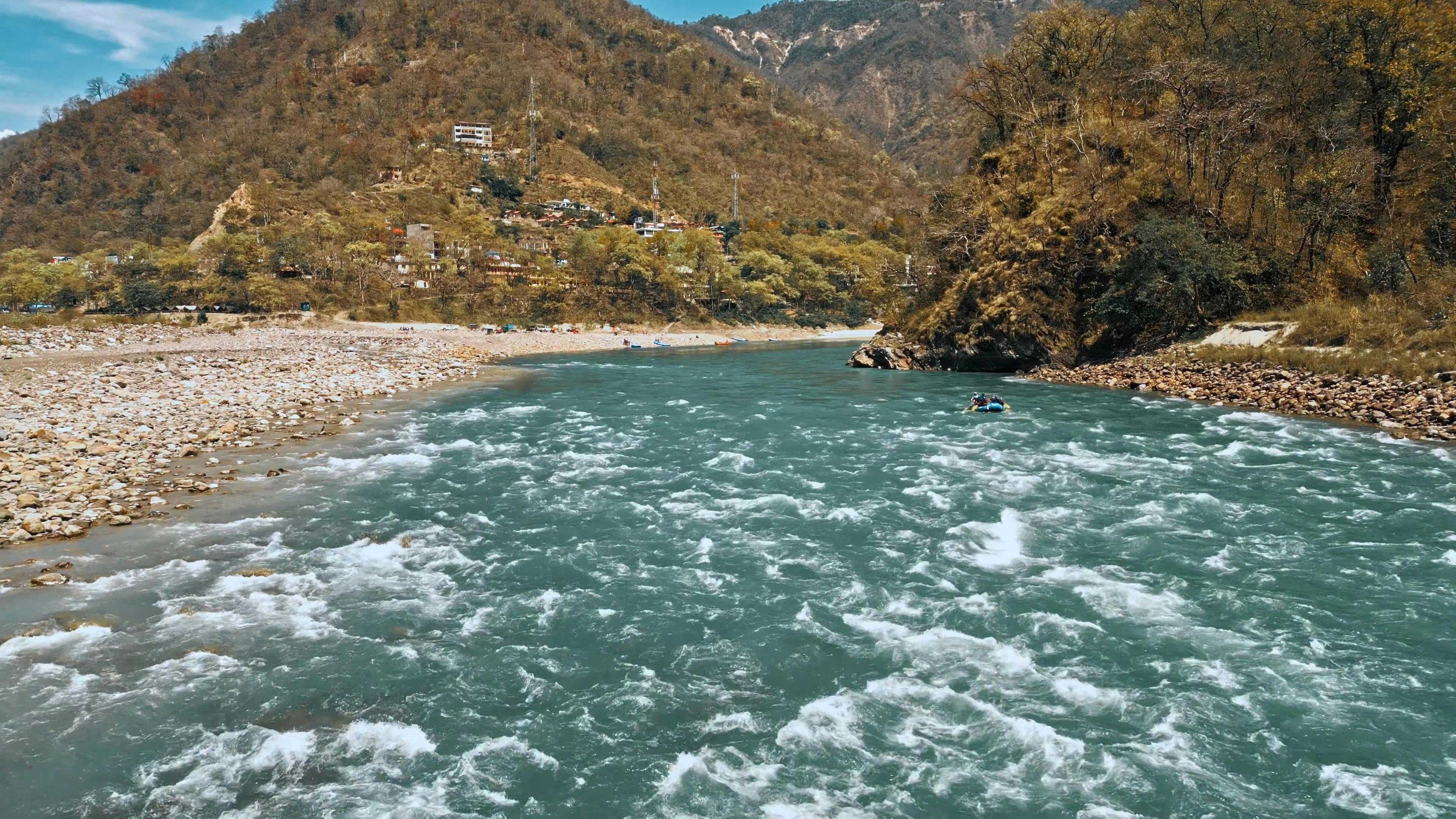 A river with rapids and mountains in the background Free Stock Video ...