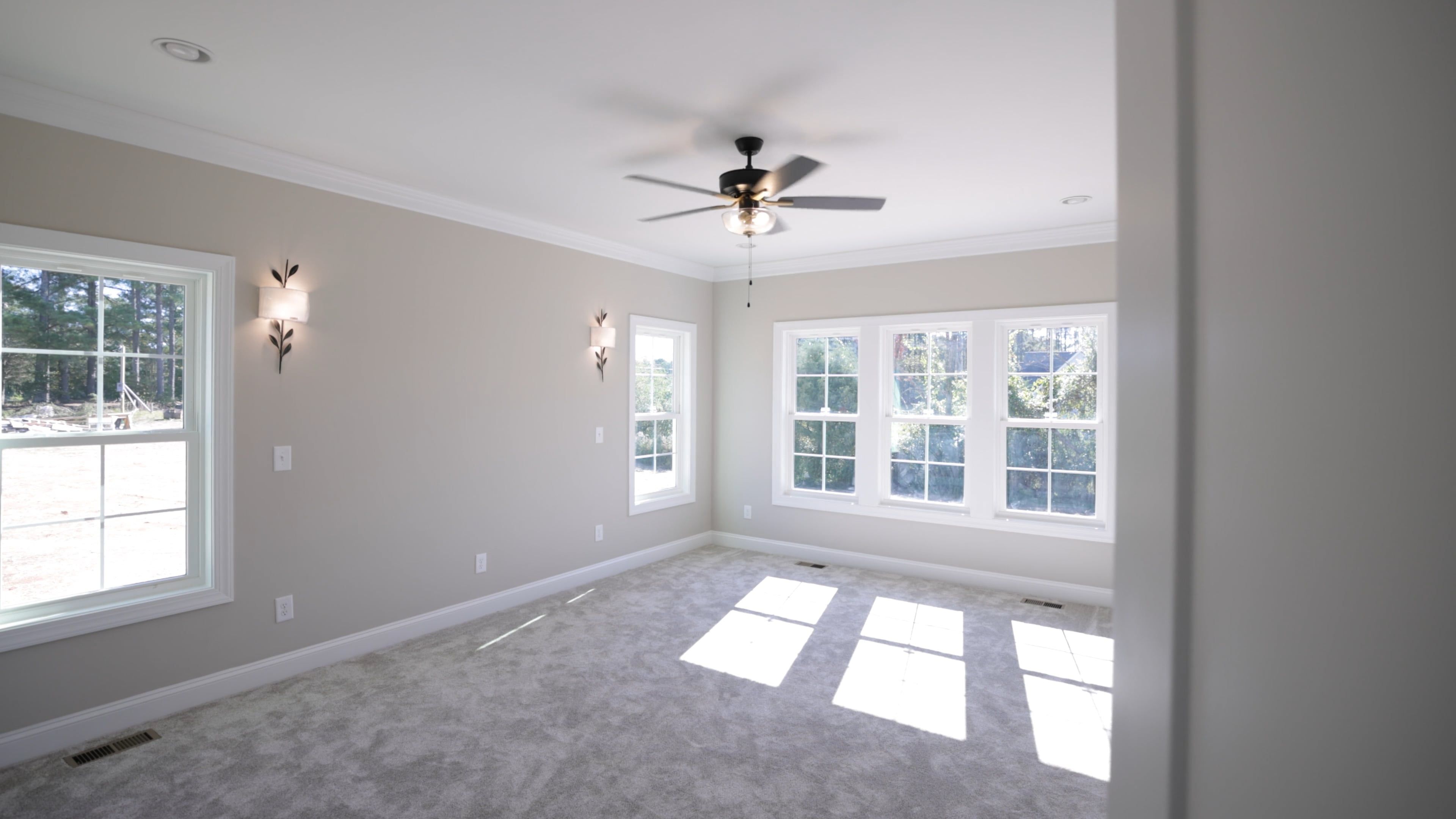 Empty room with ceiling fan and windows Free Stock Video Footage ...