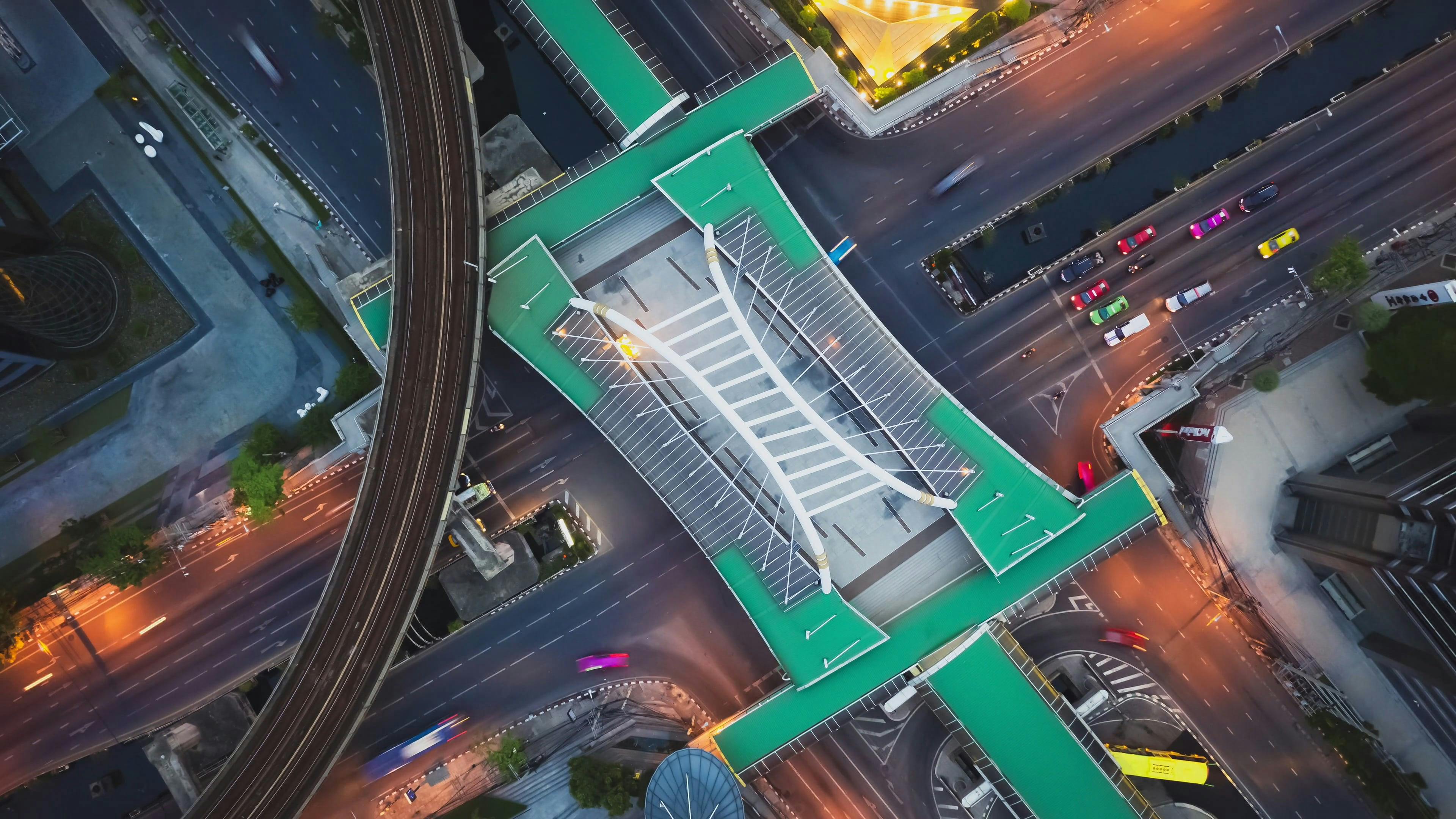 Aerial top down Hyper lapse of Traffic over big intersection bridges on ...