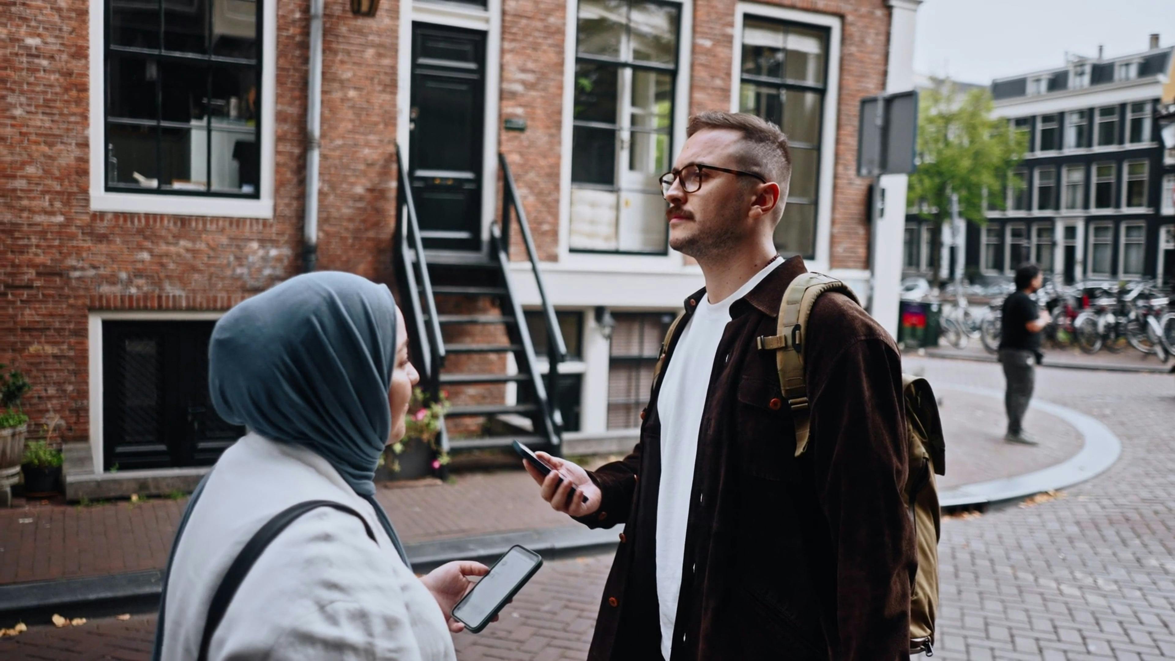 A man and woman are talking in a street Free Stock Video Footage ...