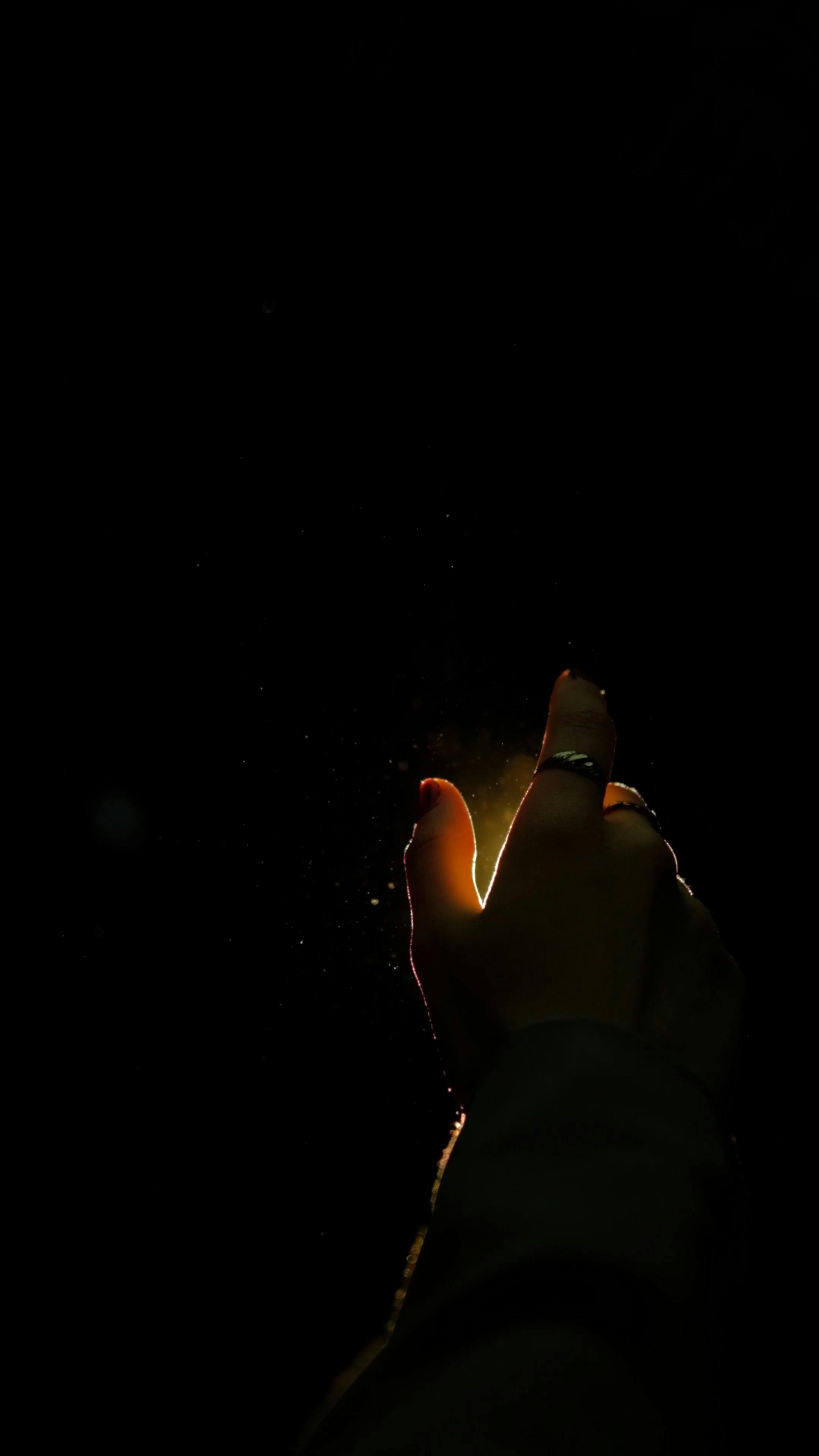 A person holding a flashlight in the dark Free Stock Video Footage ...