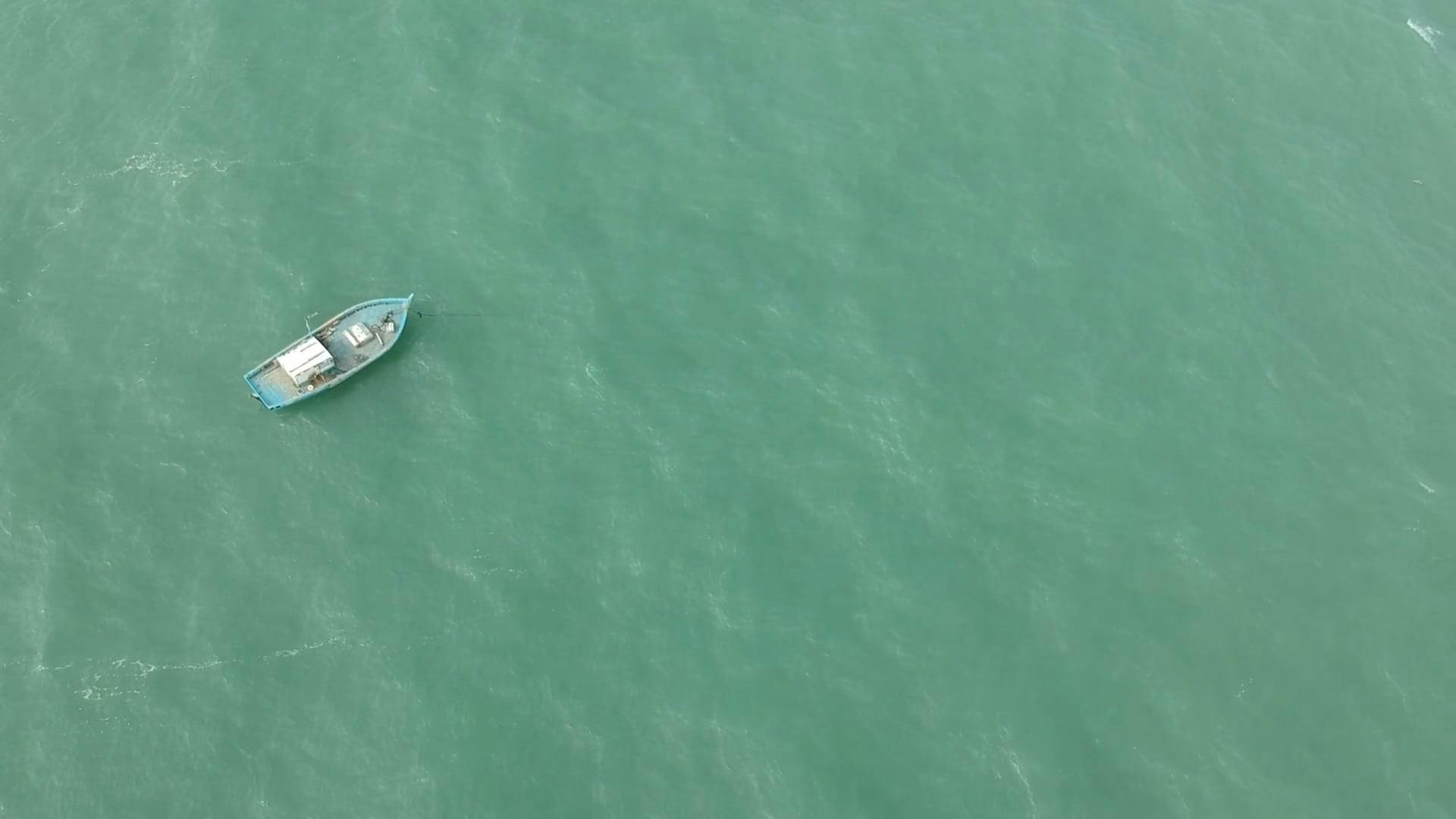 Aerial View Of An Empty Boat In The Sea · Free Stock Video