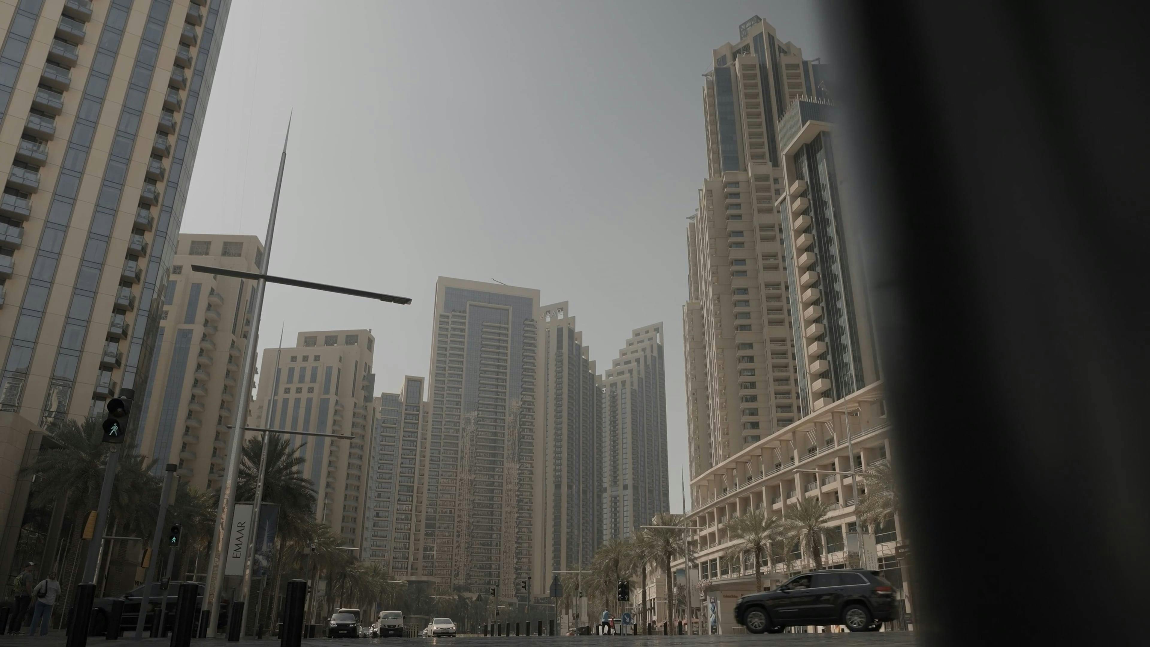 A city street with tall buildings in the background Free Stock Video ...