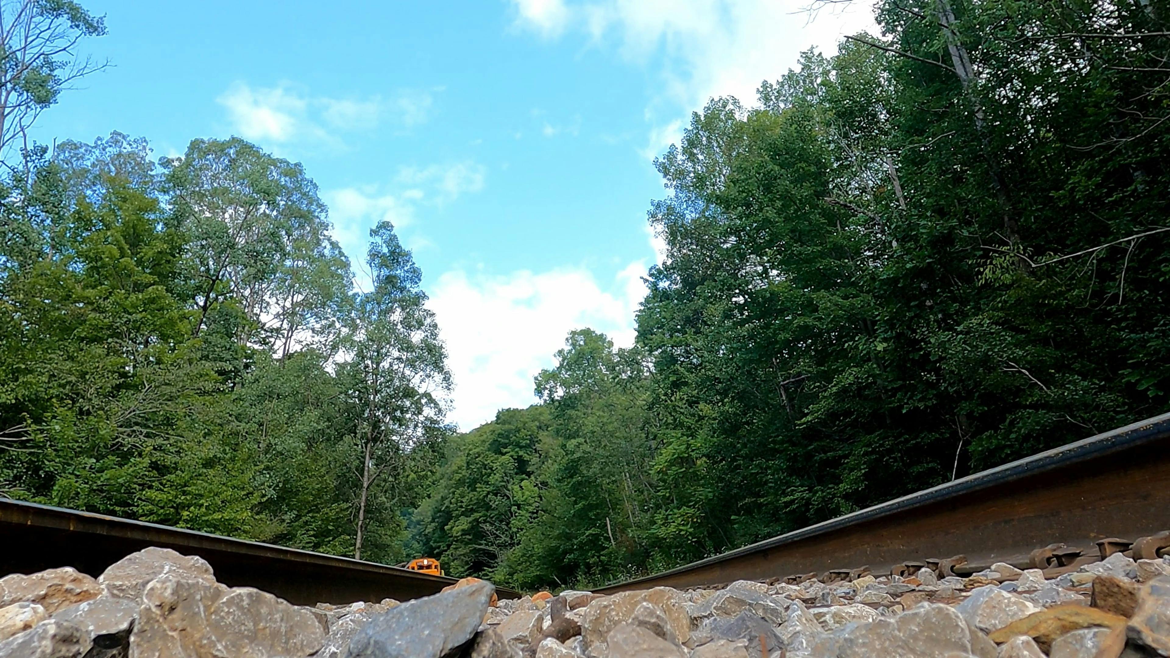 A Locomotive with Whistle Blowing Pulling Train Free Stock Video ...