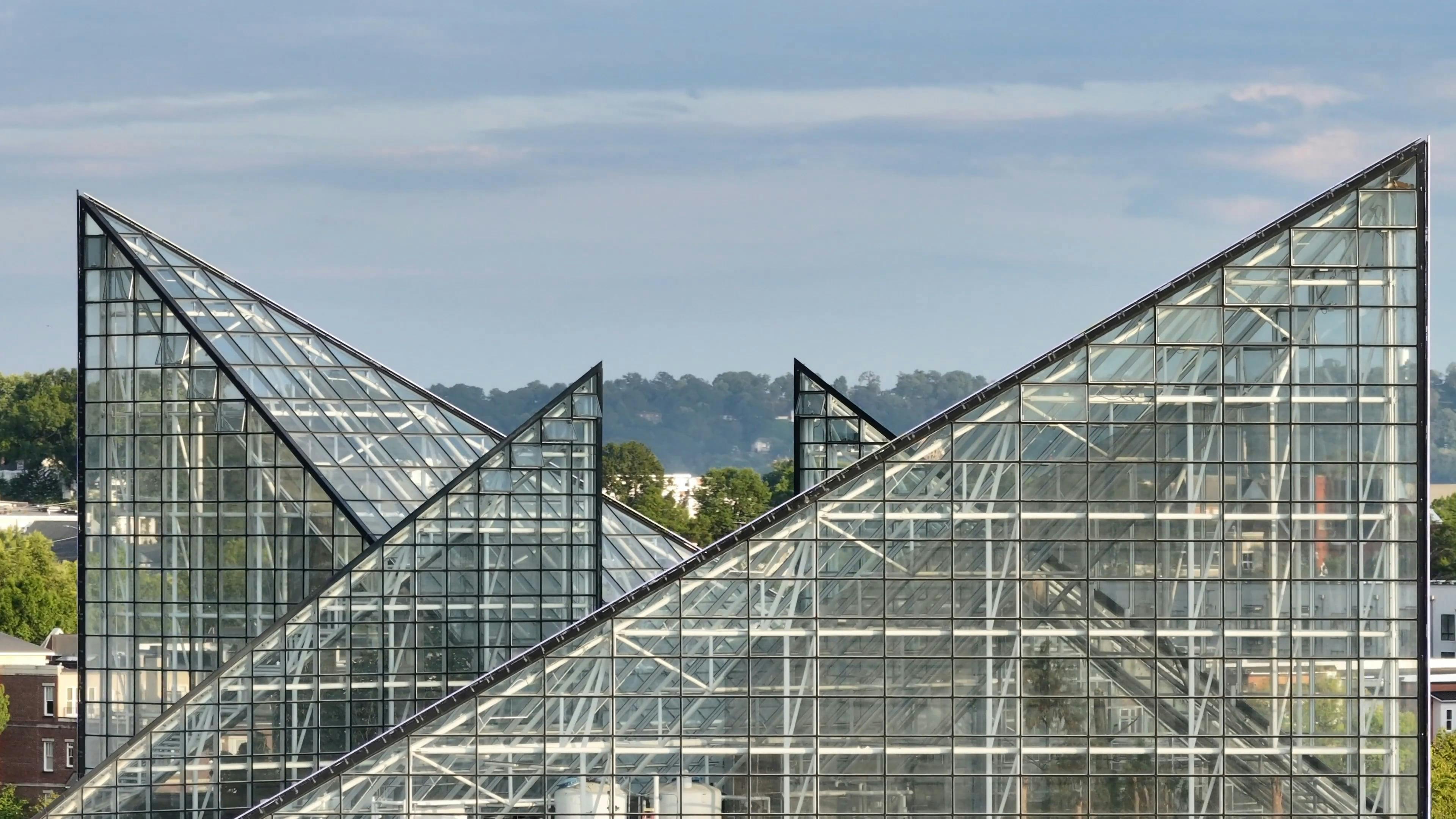 The glass pyramid is in front of a building Free Stock Video Footage ...