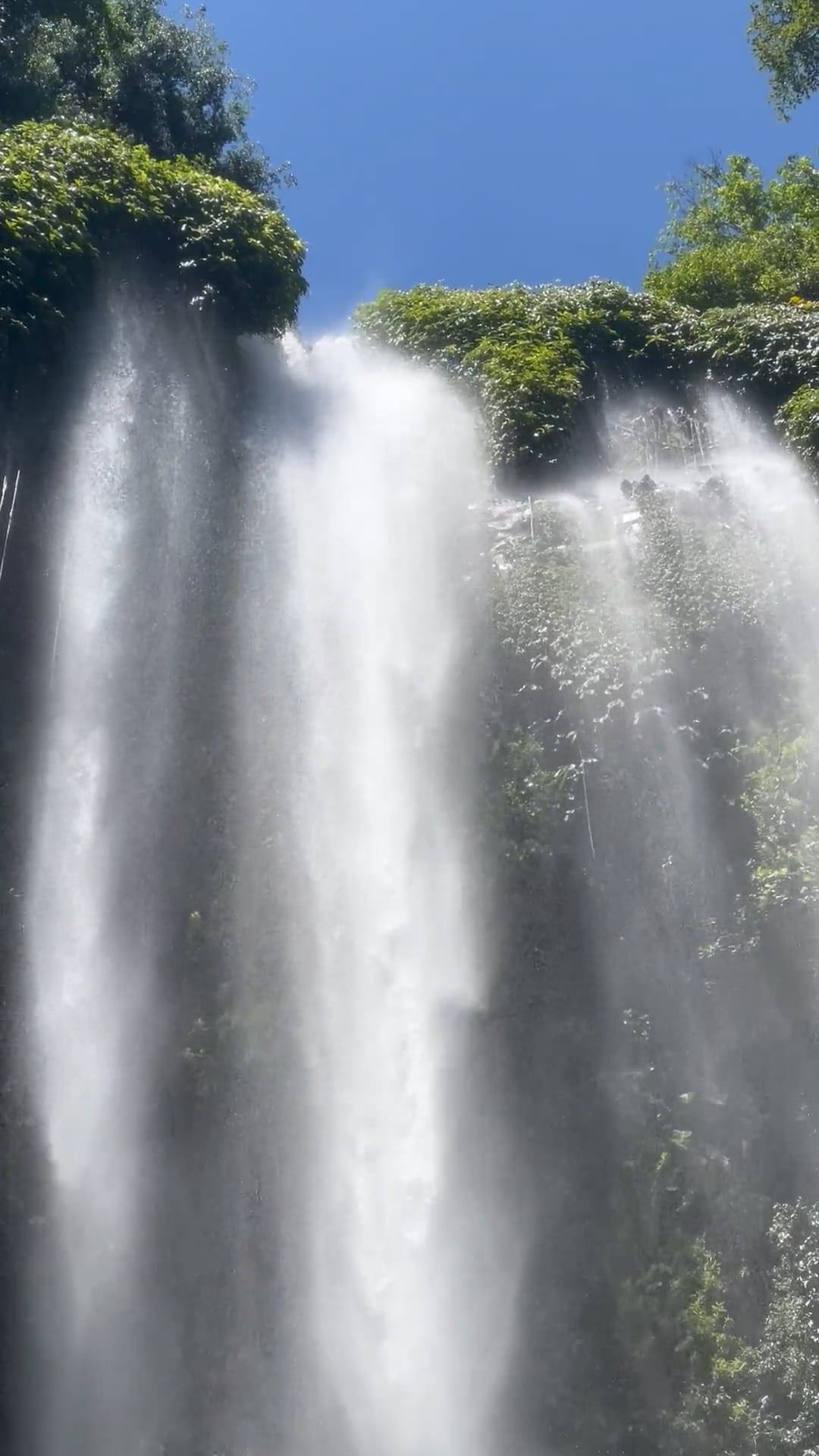 A waterfall with the words, the waterfall is a natural attraction Free ...