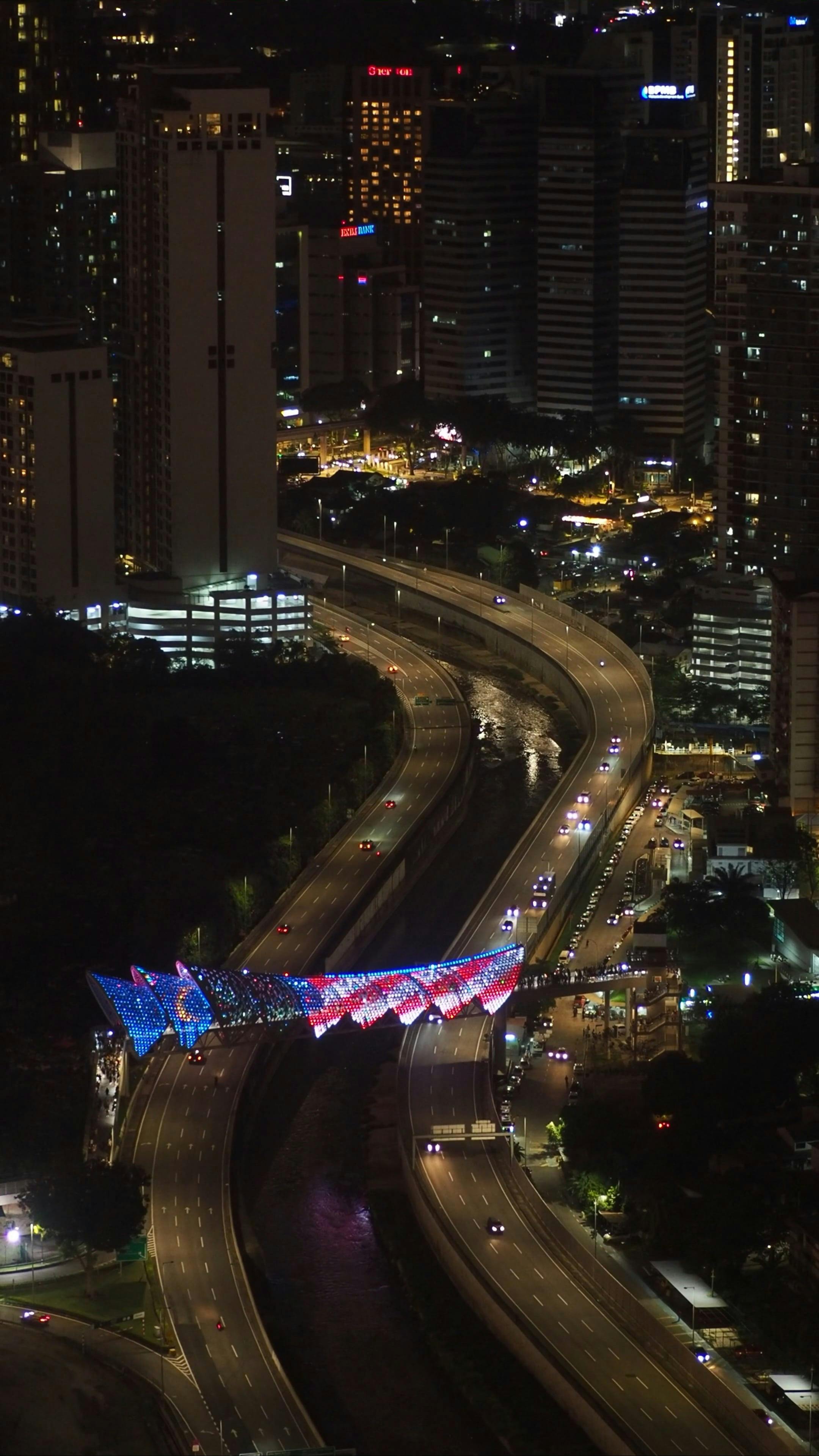 Motor Vehicles Traffic On A Busy Road Intersection In Kuala Lumpur Free ...