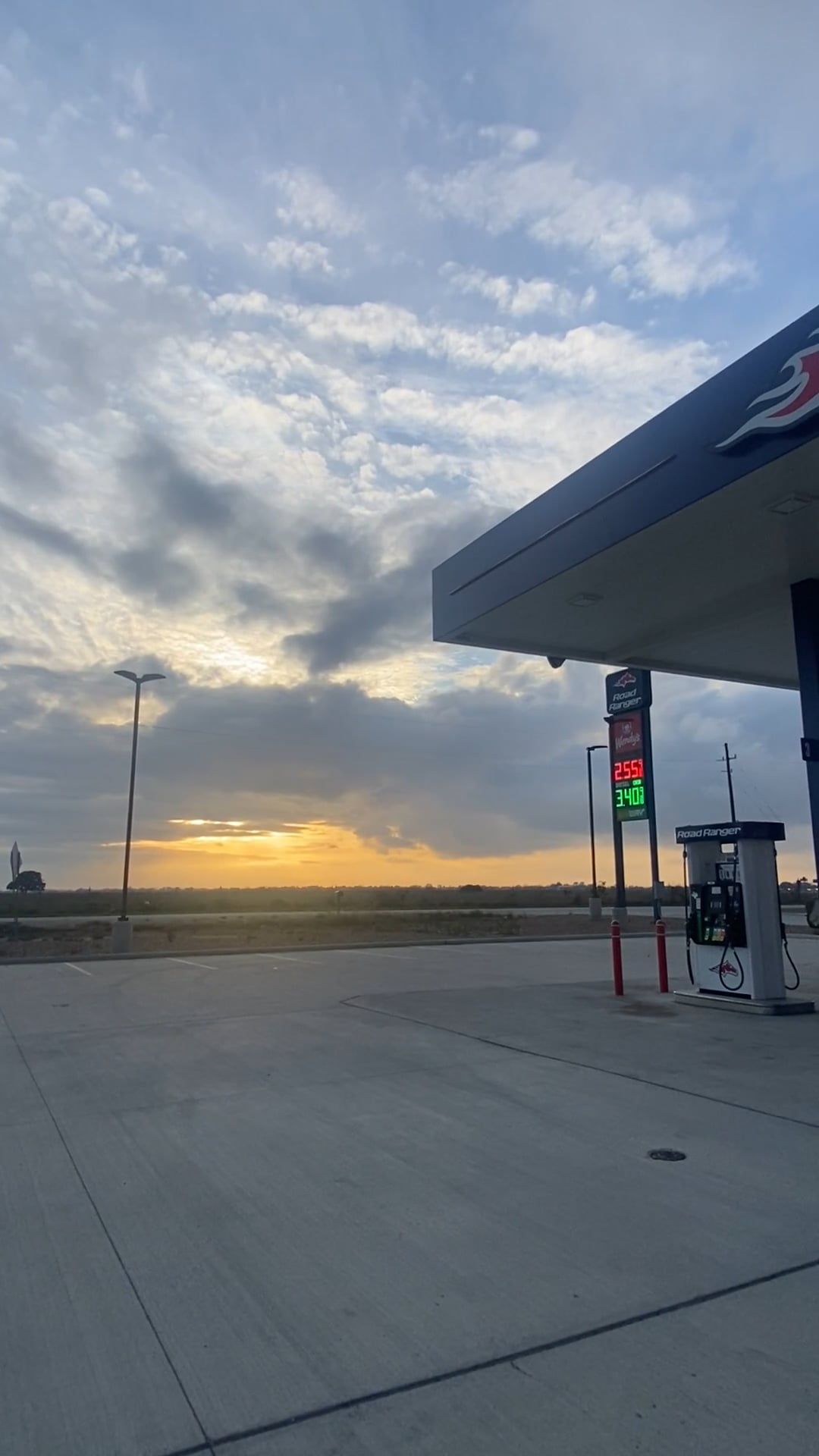 A gas station with a sunset in the background Free Stock Video Footage ...