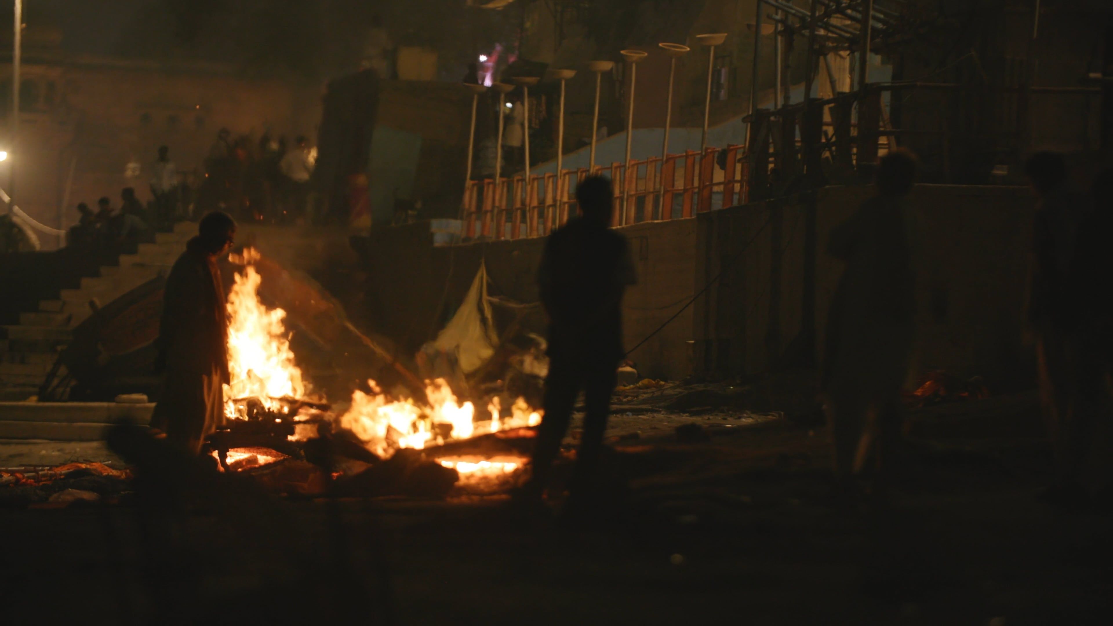 People stand around a fire at night Free Stock Video Footage, Royalty ...