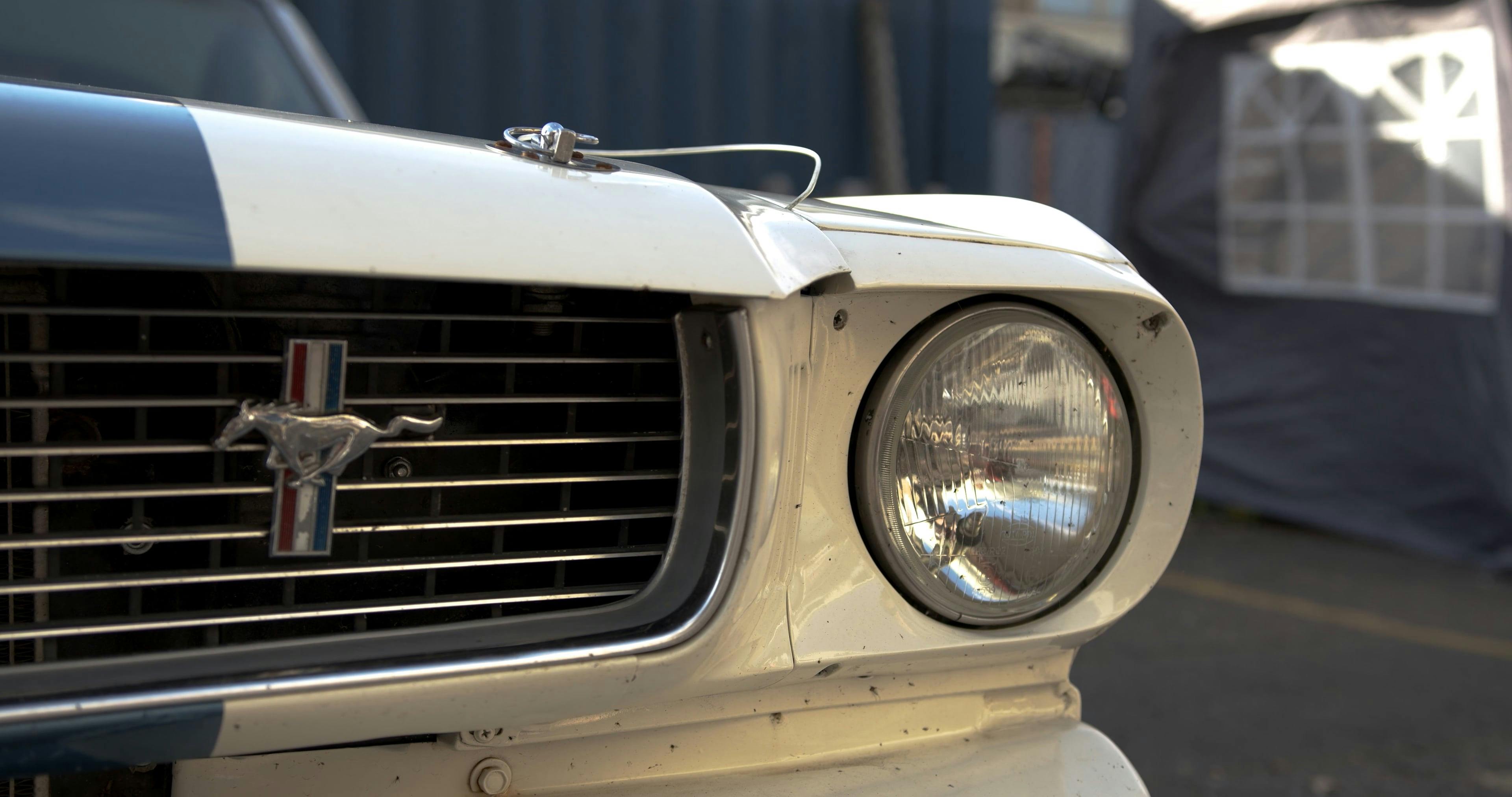 Close-up Of The Front End Of A Parked Classic Car With Its Engine ...