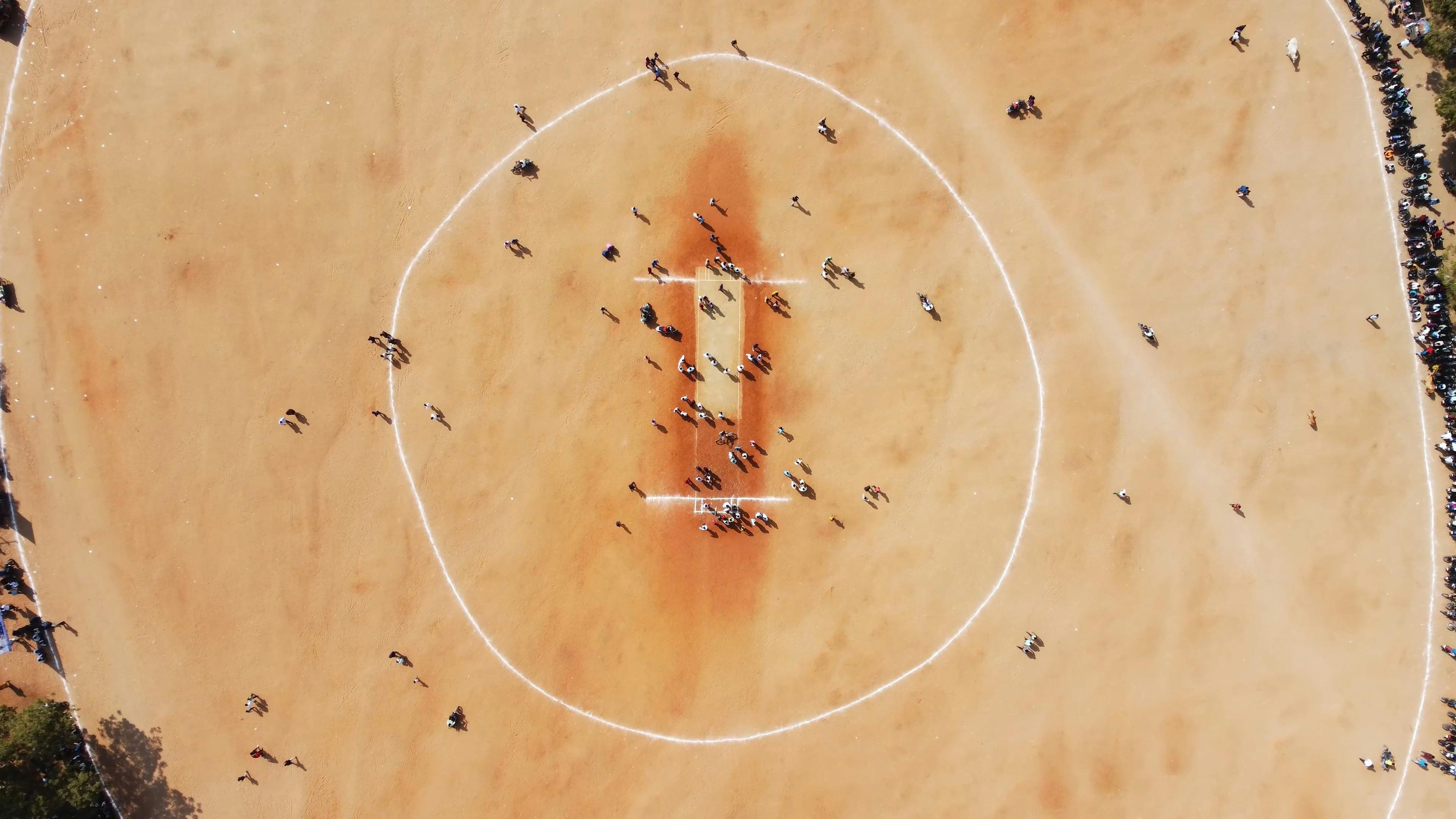 A bird's eye view of a circle with people walking around it Free Stock ...