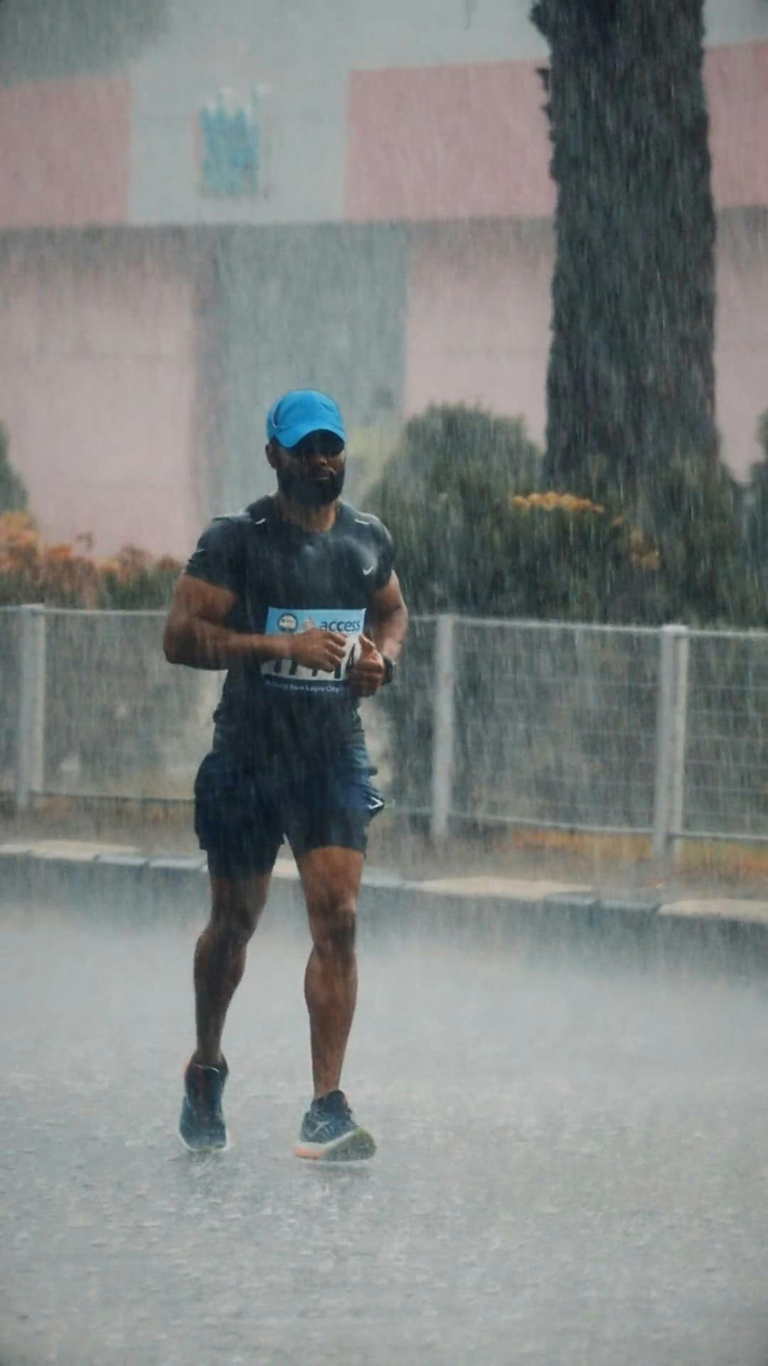 Athlete Running in the Rain during Lagos City Marathon Free Stock Video ...