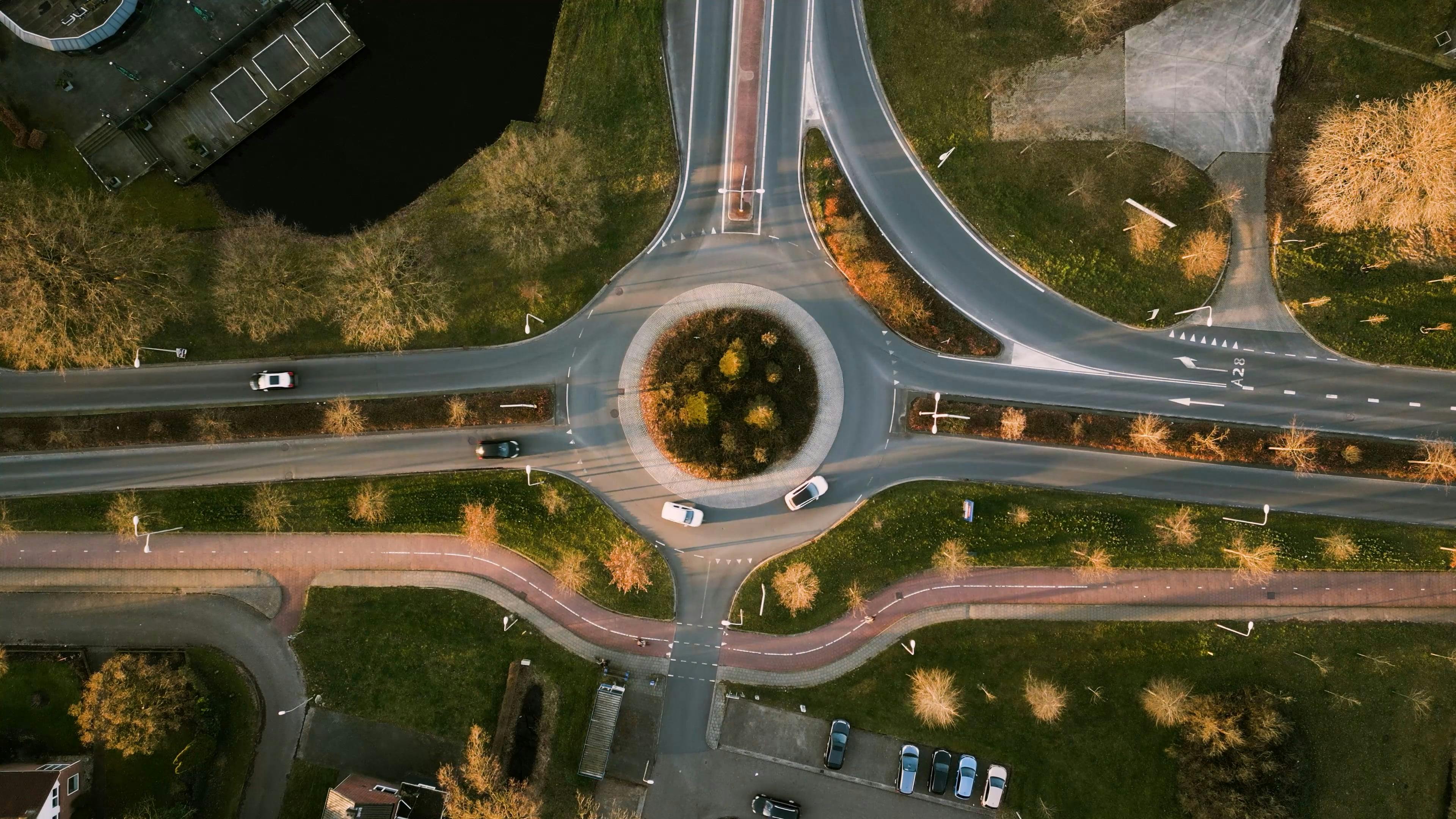 An aerial view of a roundabout with cars Free Stock Video Footage ...