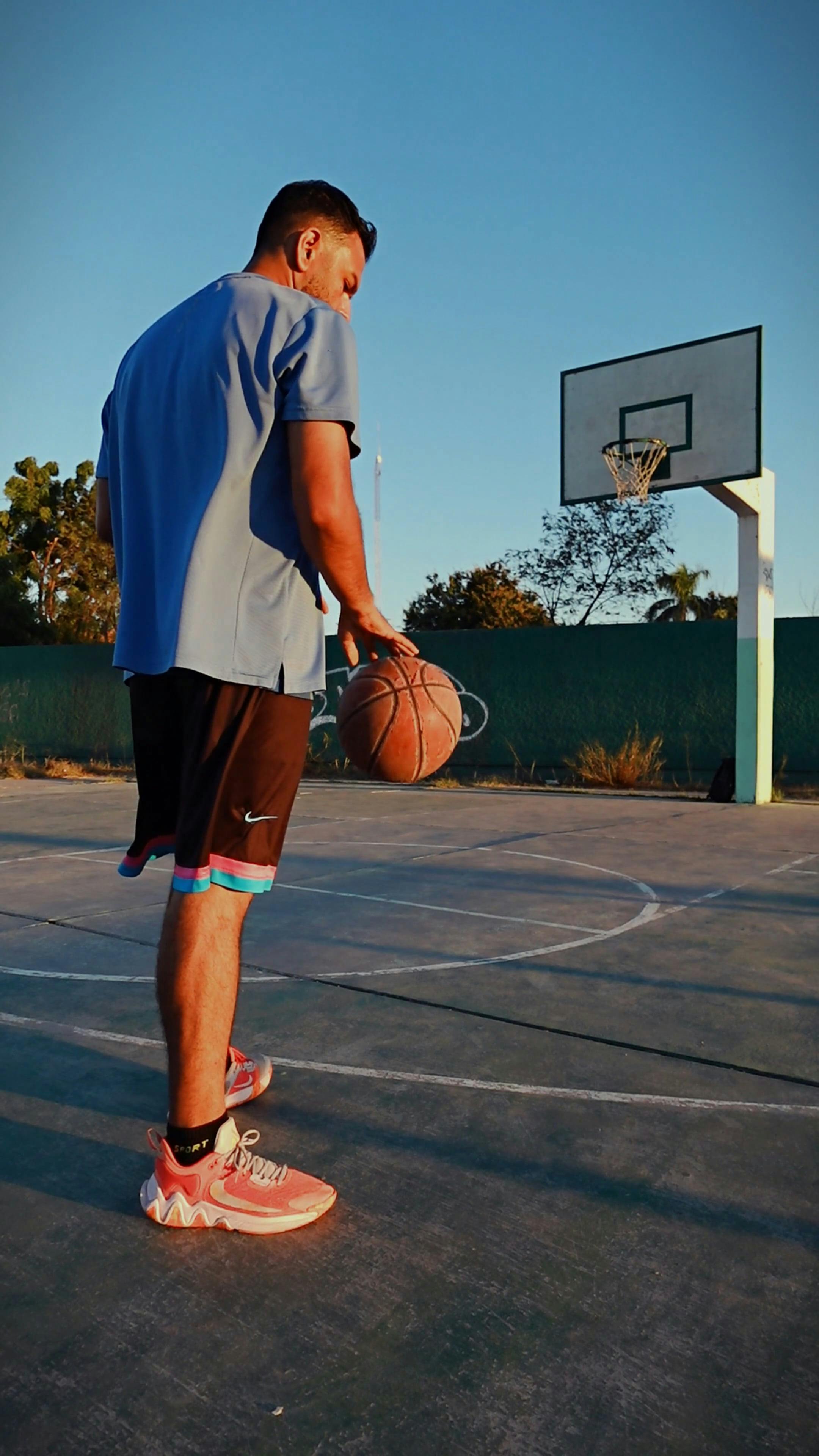 High Angle Shot of a Man Scoring Point in Basketball Free Stock Video ...