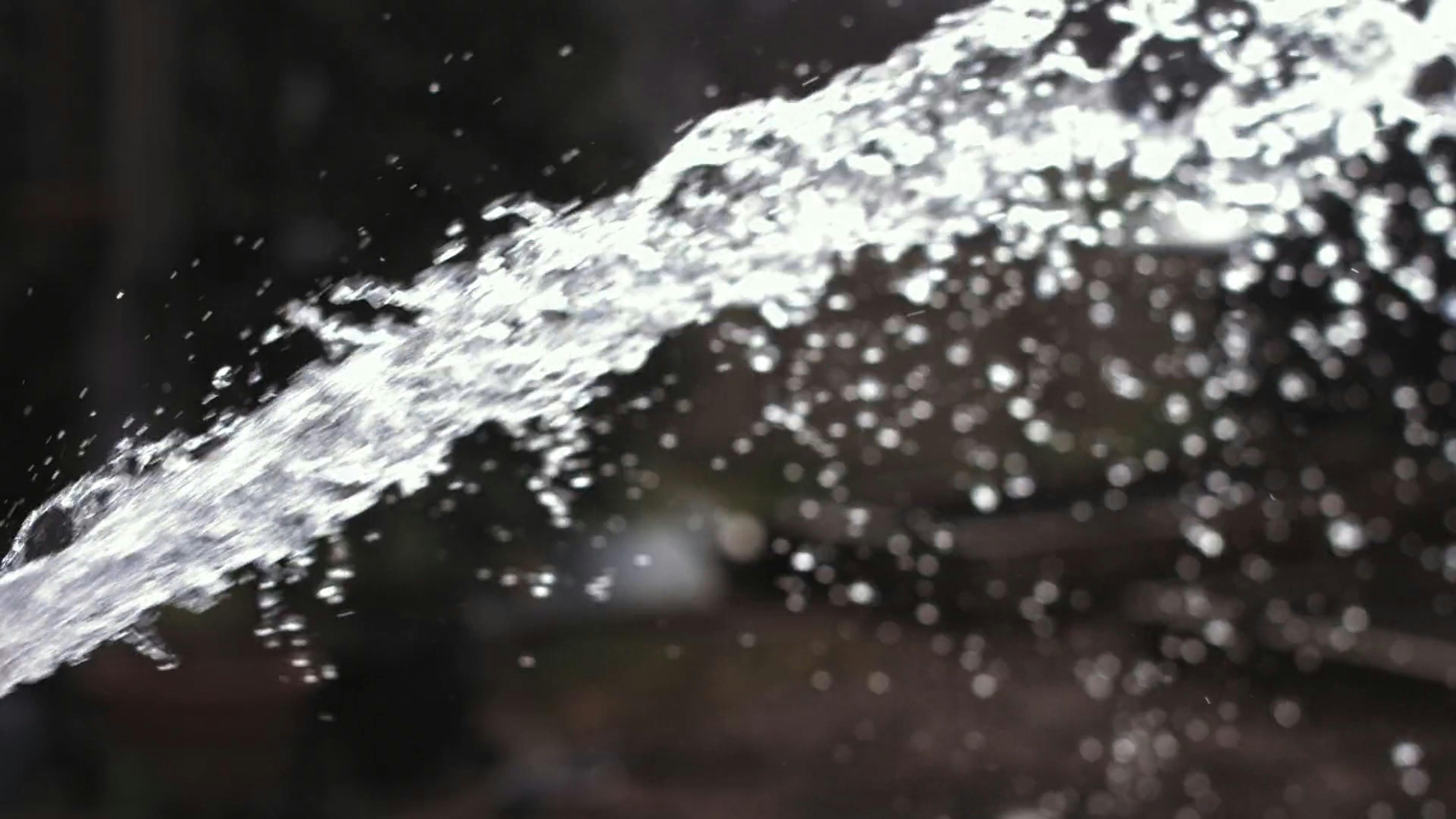 A close up of a water hose spraying water Free Stock Video Footage ...