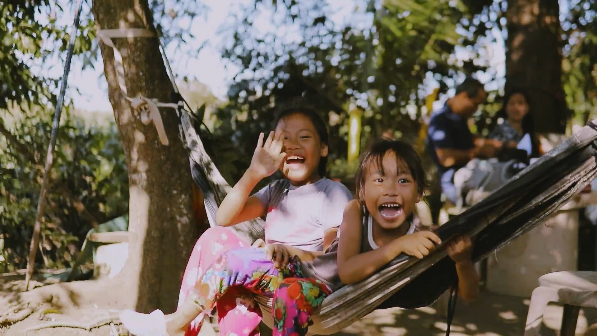 Two children are sitting in a hammock Free Stock Video Footage, Royalty ...
