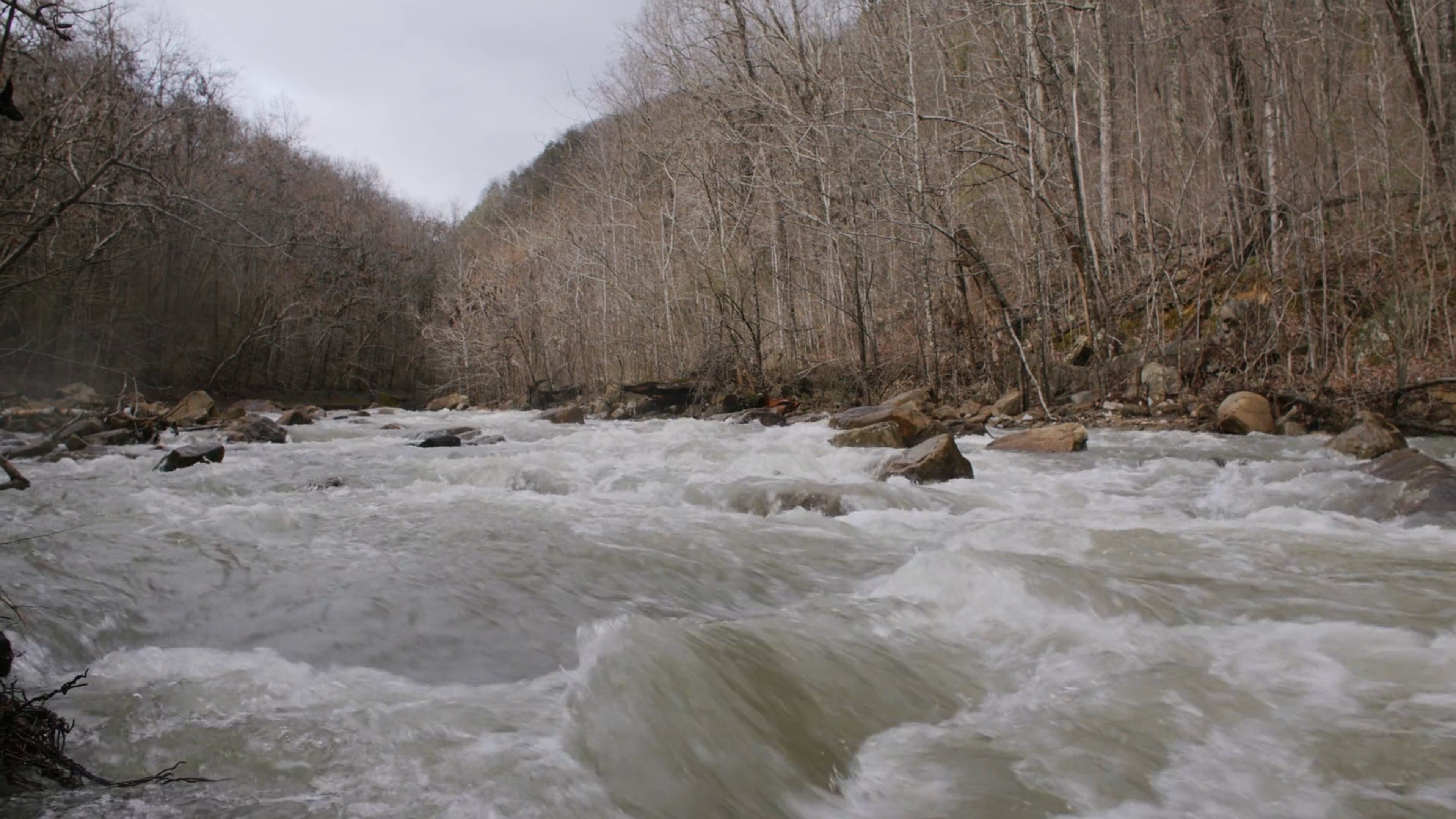 A river with rapids and rocks in the middle Free Stock Video Footage ...