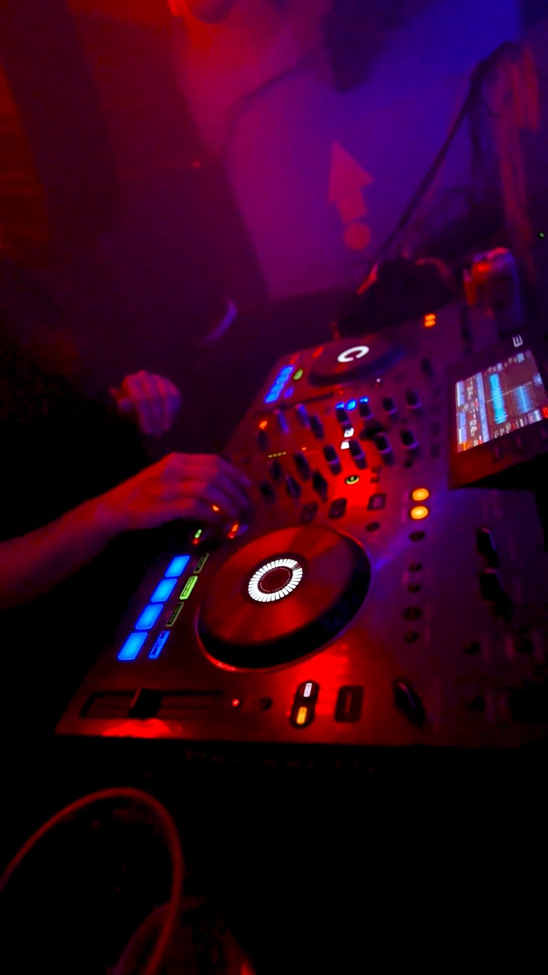 Dj playing music in a dark room with red lights Free Stock Video ...